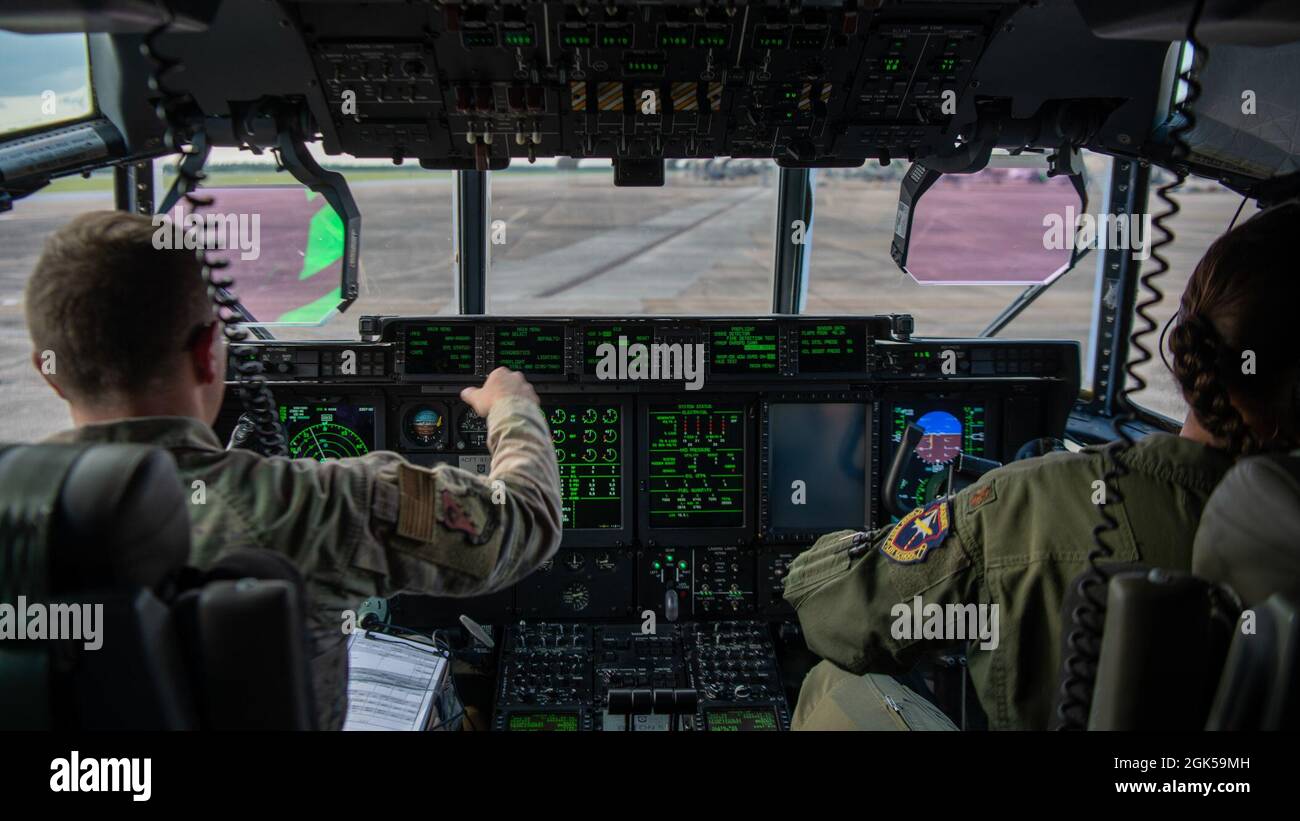 U.S. Air Force Maj. Jonathan Forsyth, left, a 492nd Special Operations ...