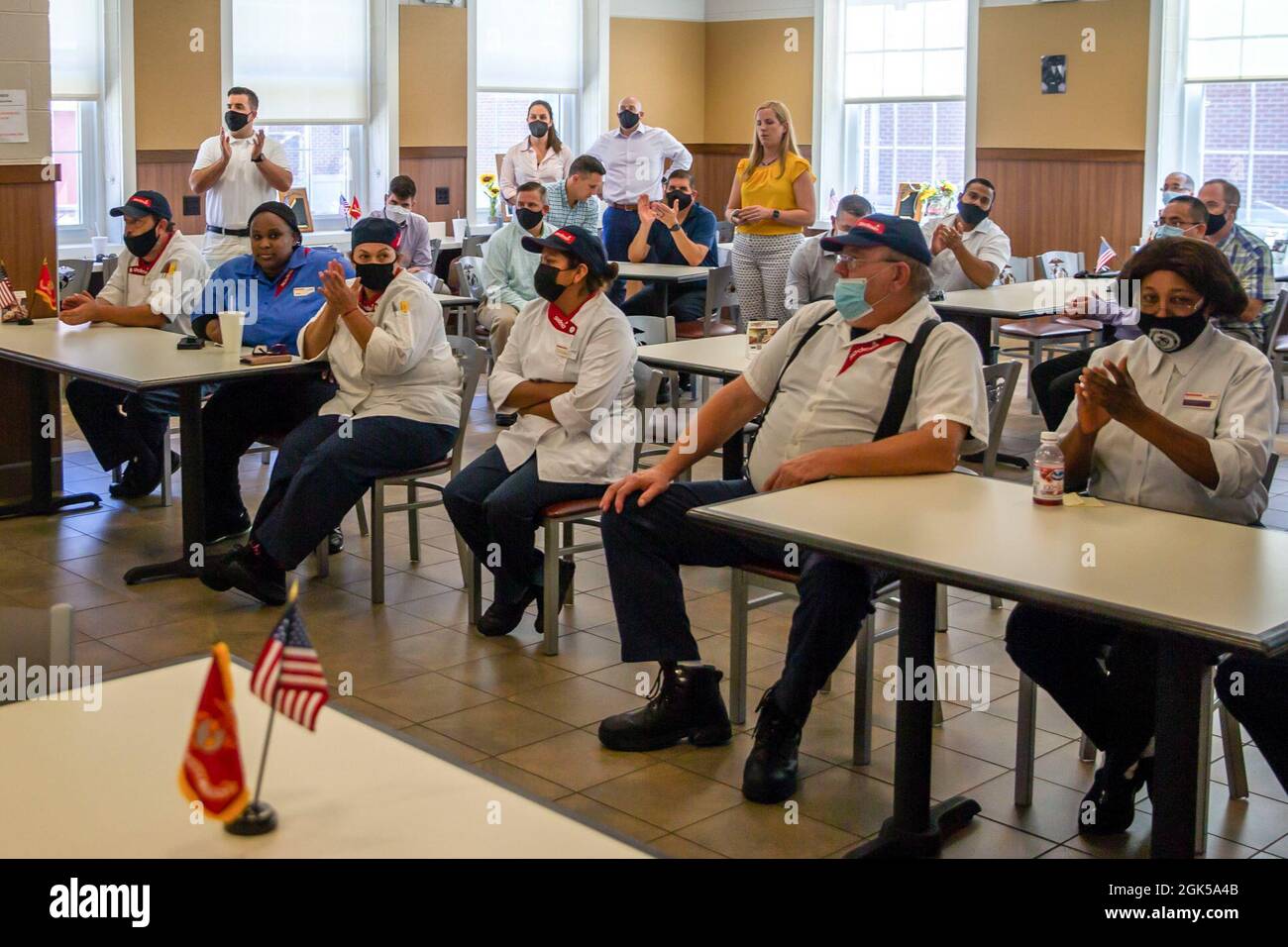 Dwyer Hall employees give a round of applause during the Mess Hall of ...