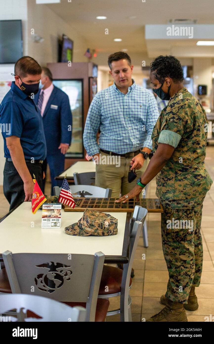 Attendees of Dwyer Hall’s Mess Hall of the Quarter award ceremony view ...