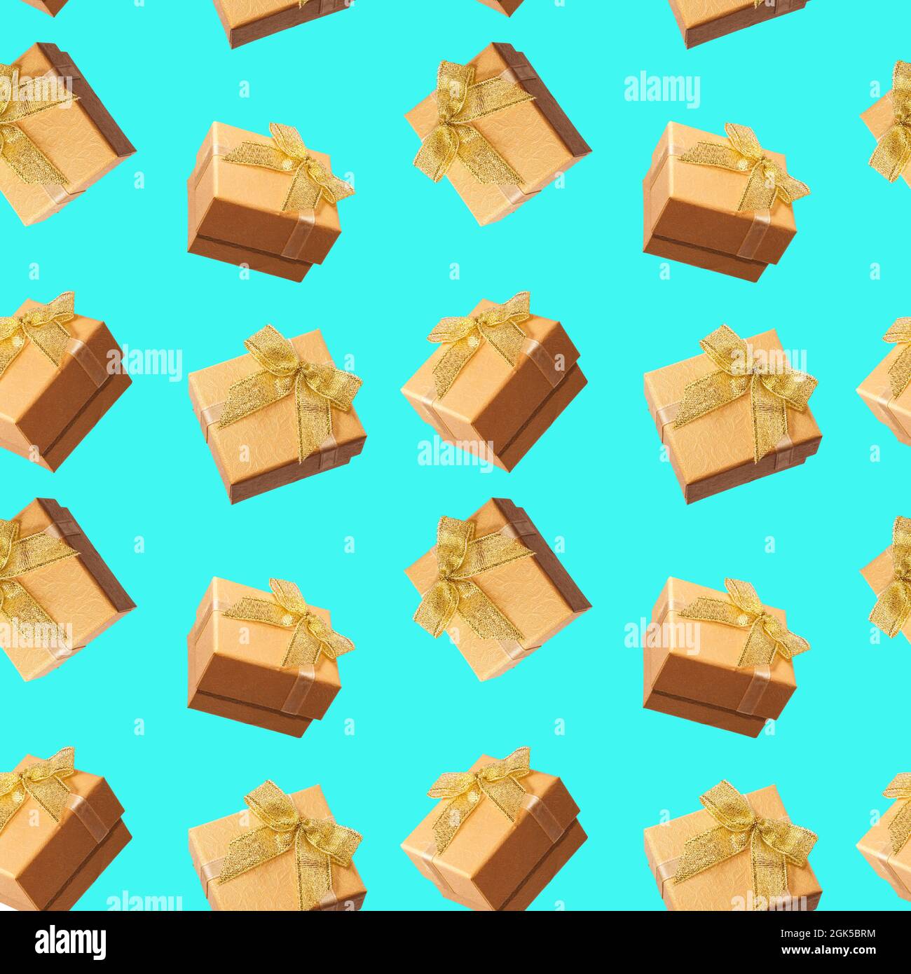 Seamless pattern with gold gift boxes isolated on white. Pattern for ...