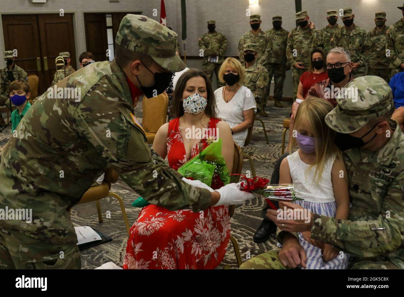 Family members of U.S. Army Lt. Col. Jeffery R. Fuller, the outgoing ...
