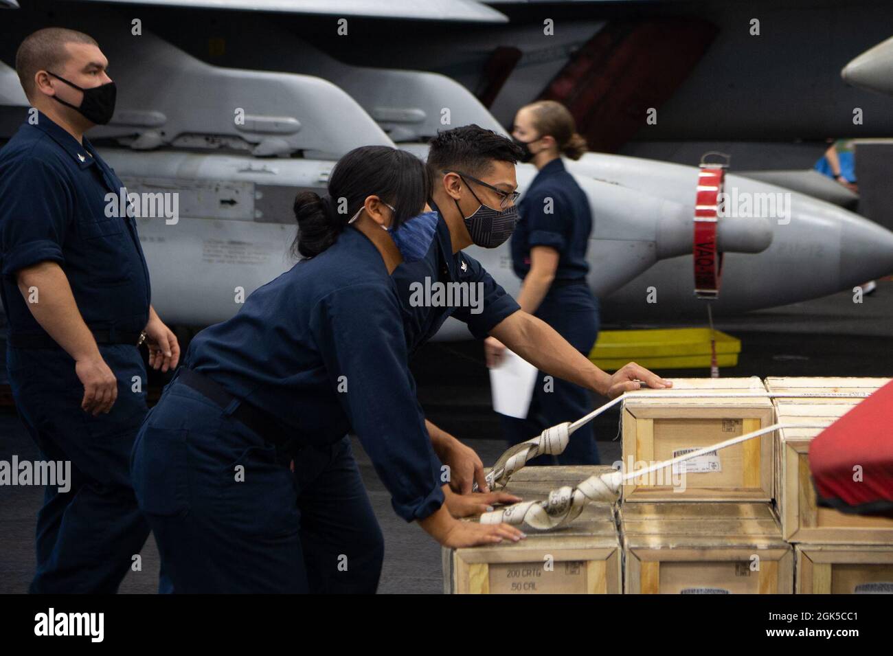 210806-N-MD461-1033 PACIFIC OCEAN (August 6, 2021) Sailors transport ...