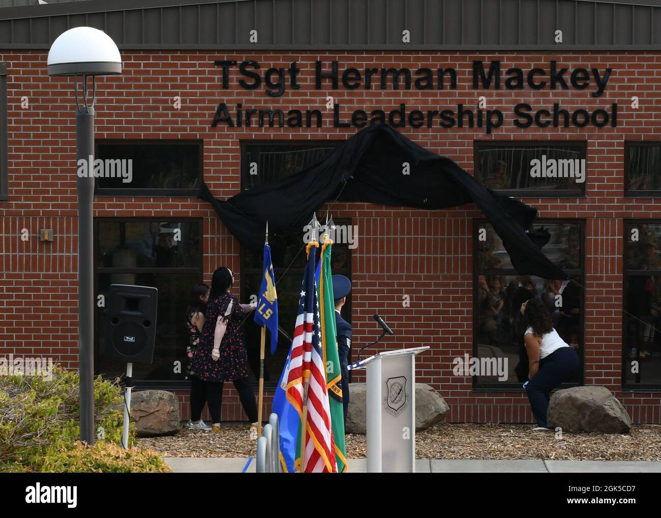 Family members of U.S. Air Force Tech. Sgt. Herman ‘Tre’ Mackey III ...