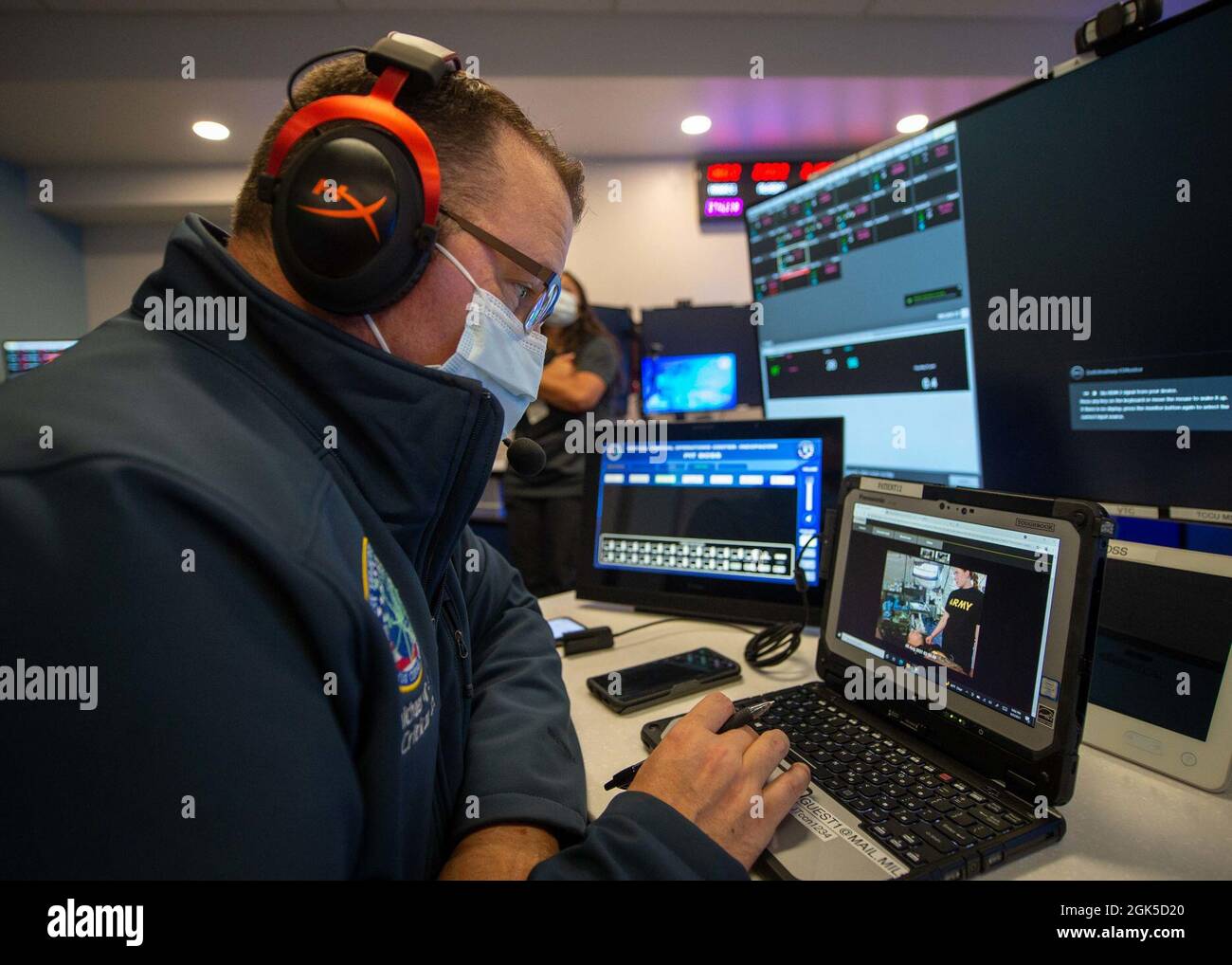 210805-N-XZ205-1040 SAN DIEGO (Aug. 5, 2021) Cmdr. J. Jonas Carmichael ...