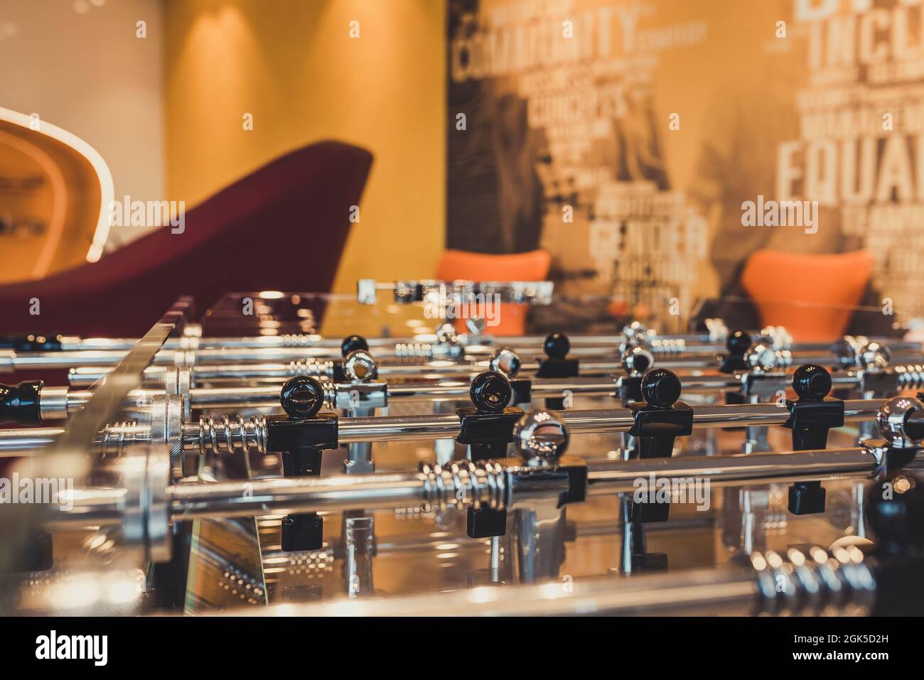 Table soccer game in the pub with diversity and equality concept ...