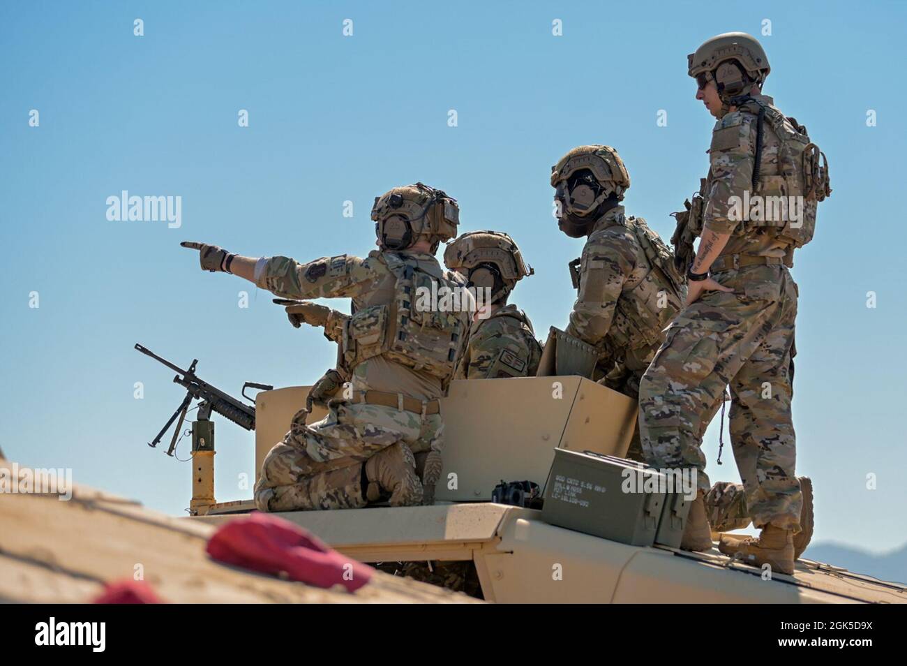 U.S. Air Force, 126th Security Forces Squadron members, discuss firing ...