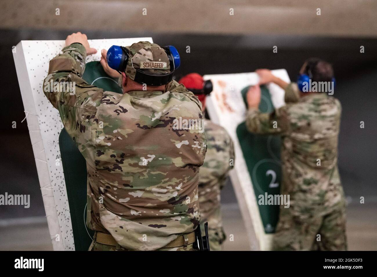 Chief Master Sgt. Thomas Schaefer, 8th FW command chief, left, and Col ...