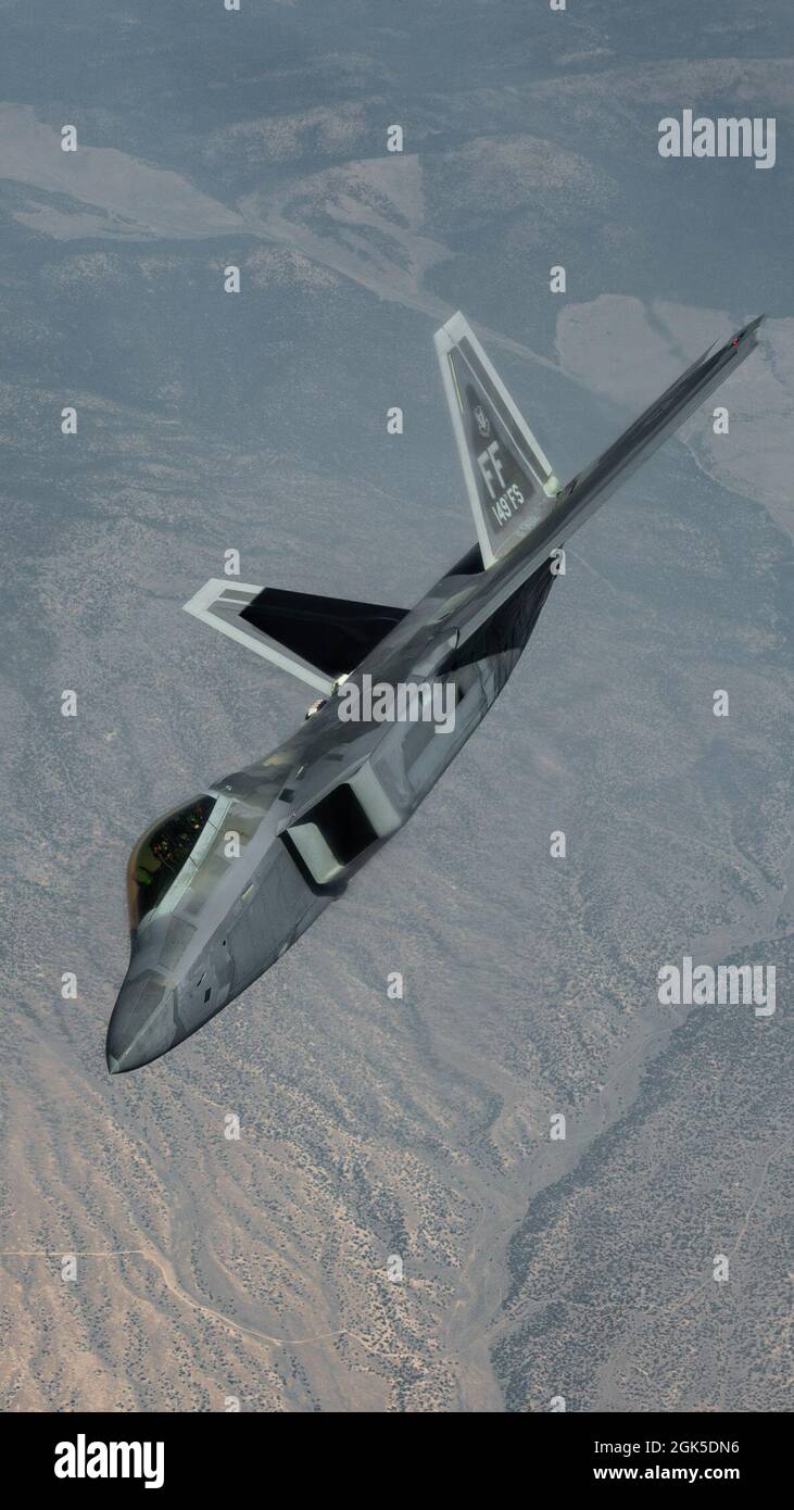 An F-22 Raptor assigned to assigned to the 27th Fighter Squadron from ...