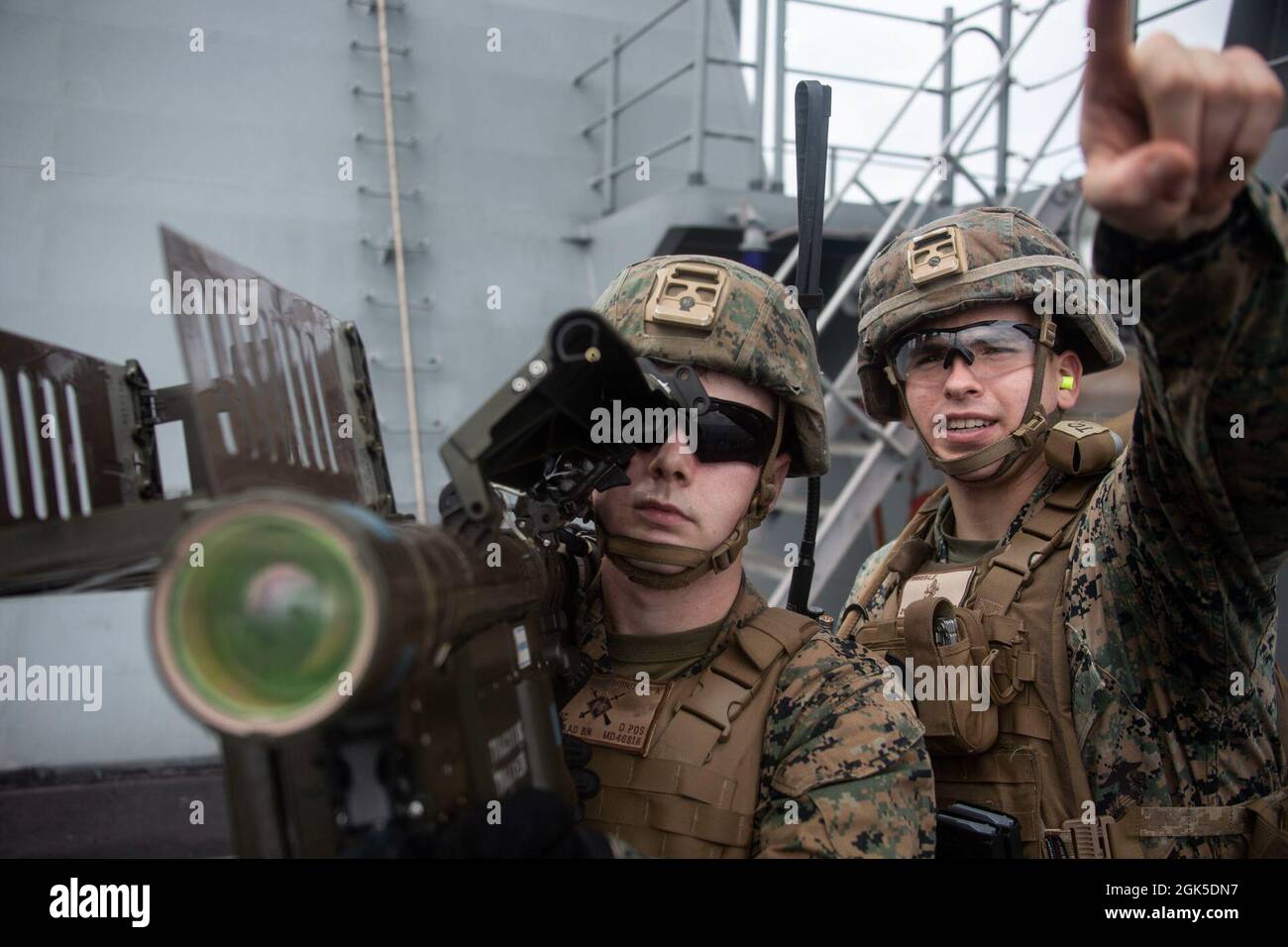 U.S. Marine Corps Lance Cpl. Domonic Mundy and Cpl. Luis Torres, low ...