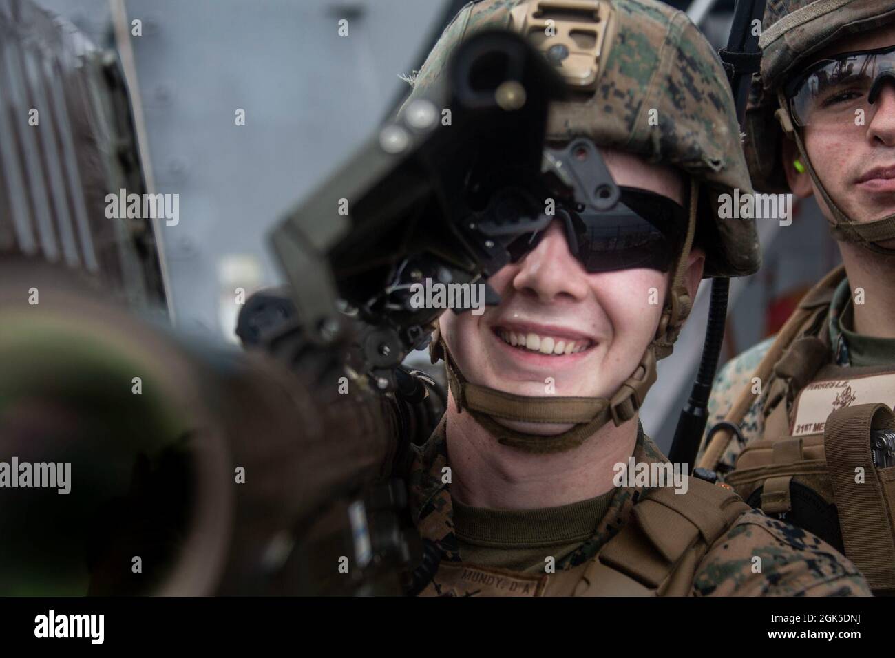 U.S. Marine Corps Lance Cpl. Domonic Mundy and Cpl. Luis Torres, low ...