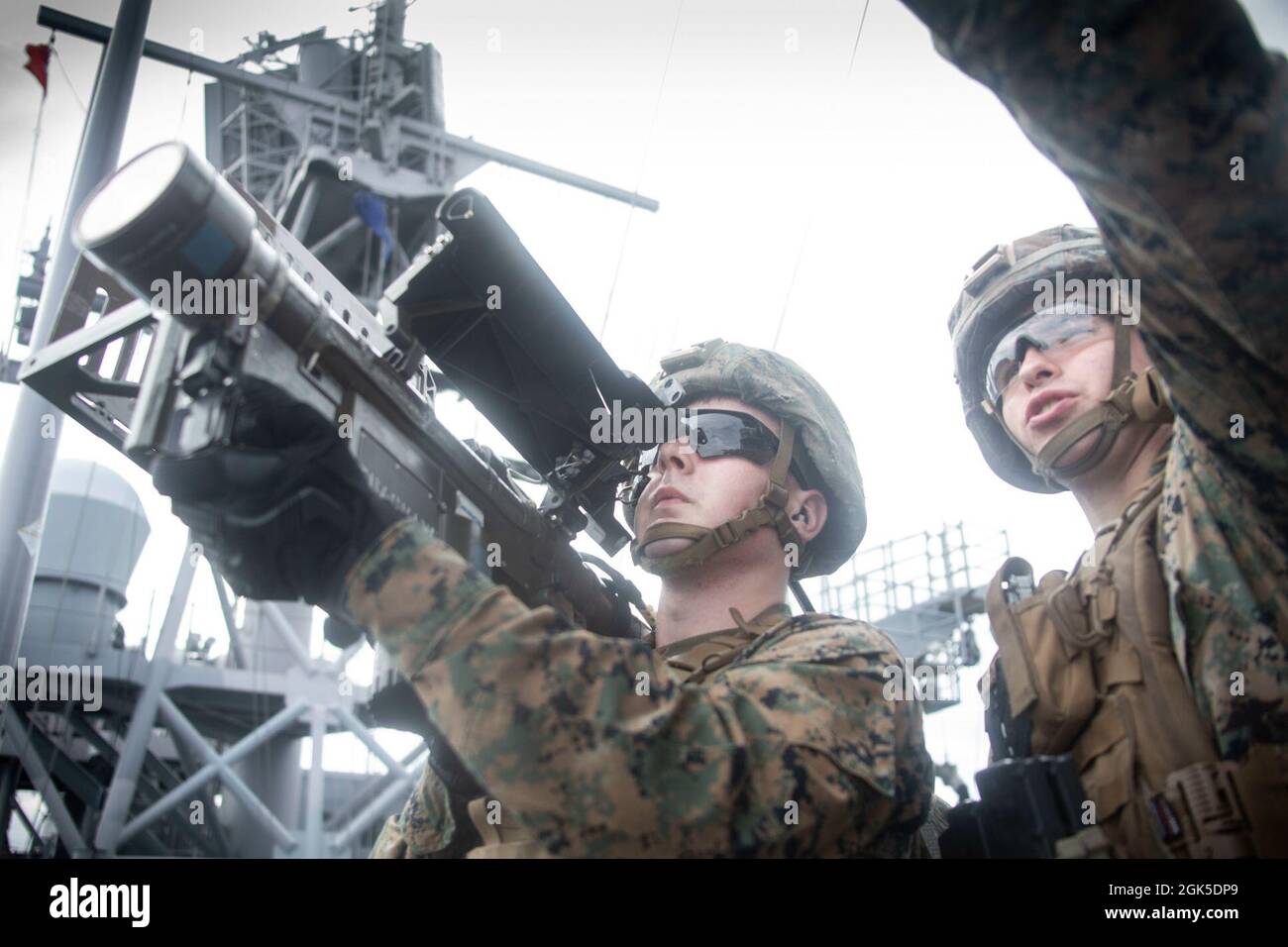 U.S. Marine Corps Lance Cpl. Domonic Mundy and Cpl. Luis Torres, low ...