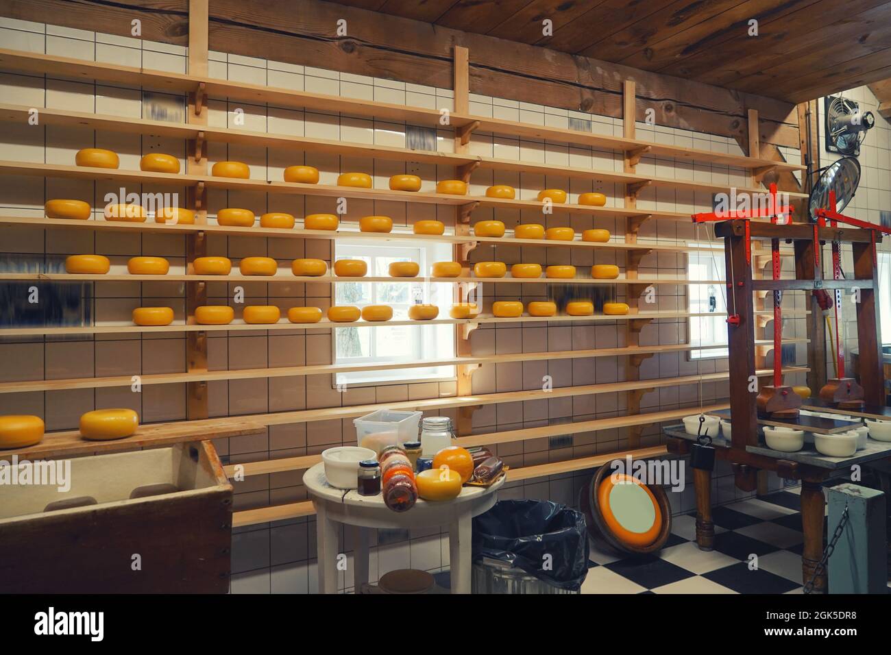 Interior view of cheese manufacturing shop Stock Photo - Alamy