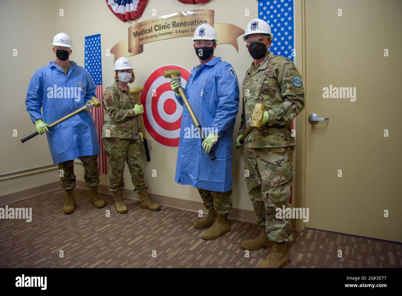 Col. Robert Long, Space Launch Delta 30 commander, CMSgt. Jason DeLucy ...