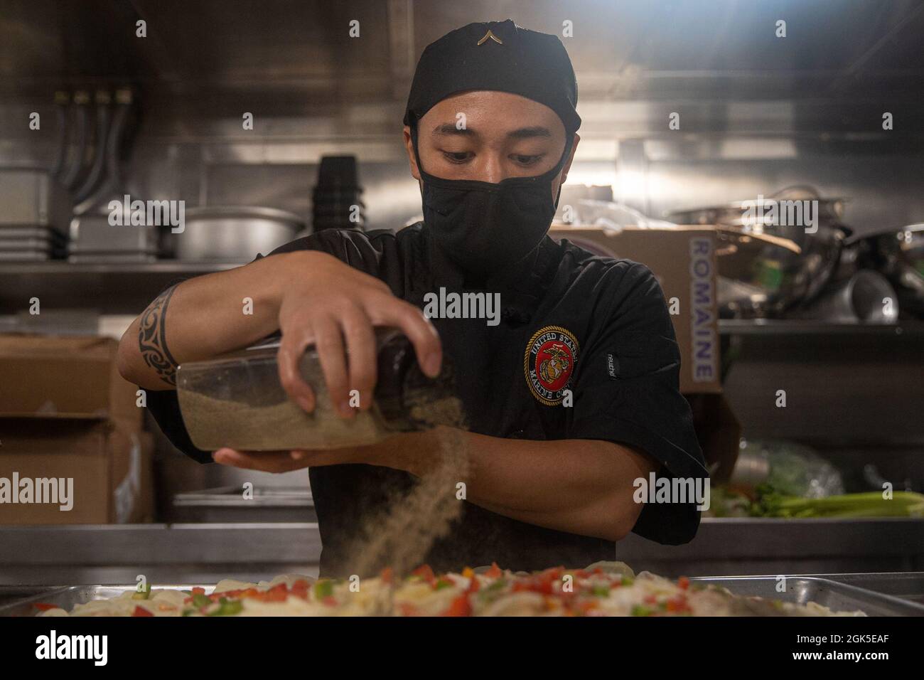 PACIFIC OCEAN (Aug. 6, 2021) U.S. Marine Corps Pfc. Jimmy Diep, a food ...