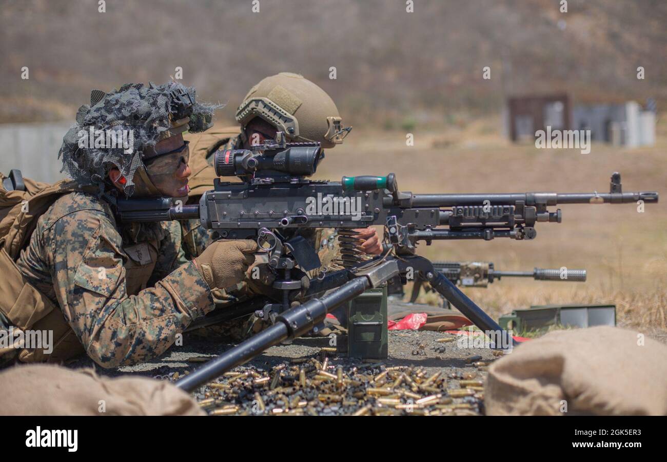 U.S. Marine Corps Lance Cpl. Caleb Parmer, a rifleman (left), and Pfc ...
