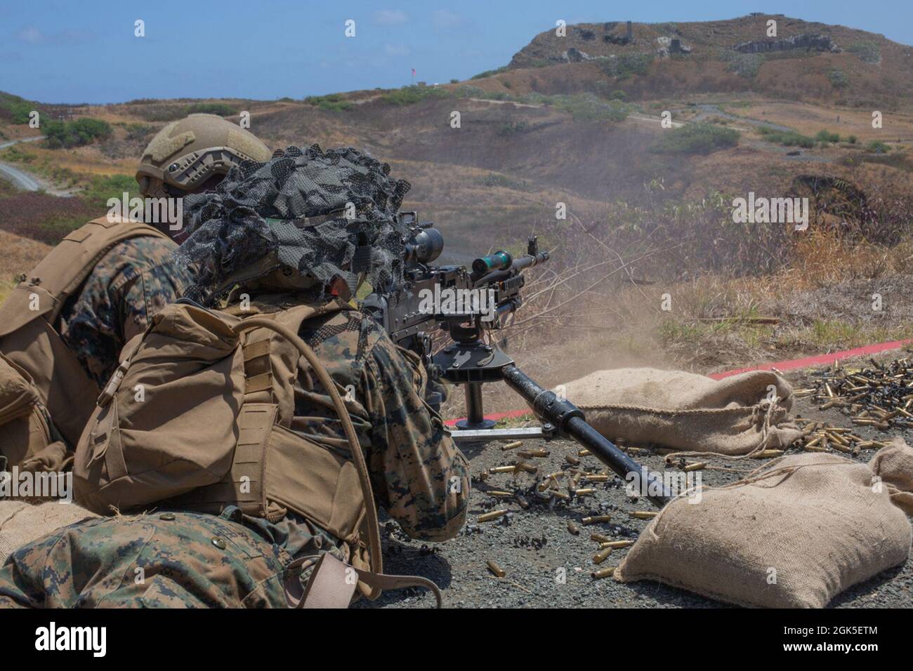 U.S. Marine Corps Pfc. Cameron Mootz, a machine gunner (left), and ...