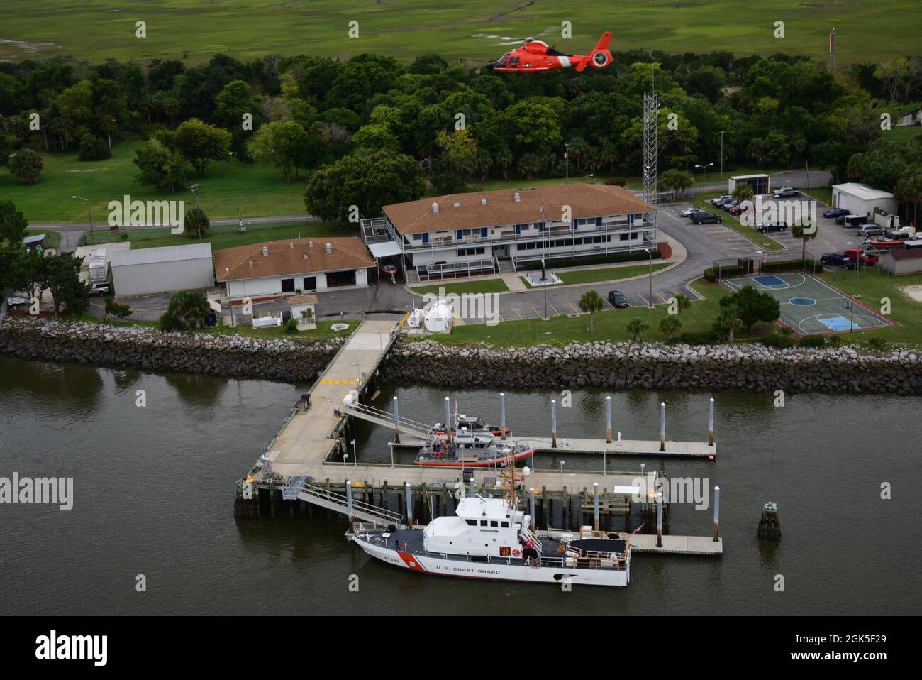 A U.S. Coast Guard MH-65D Dolphin helicopter crew from Air Station ...