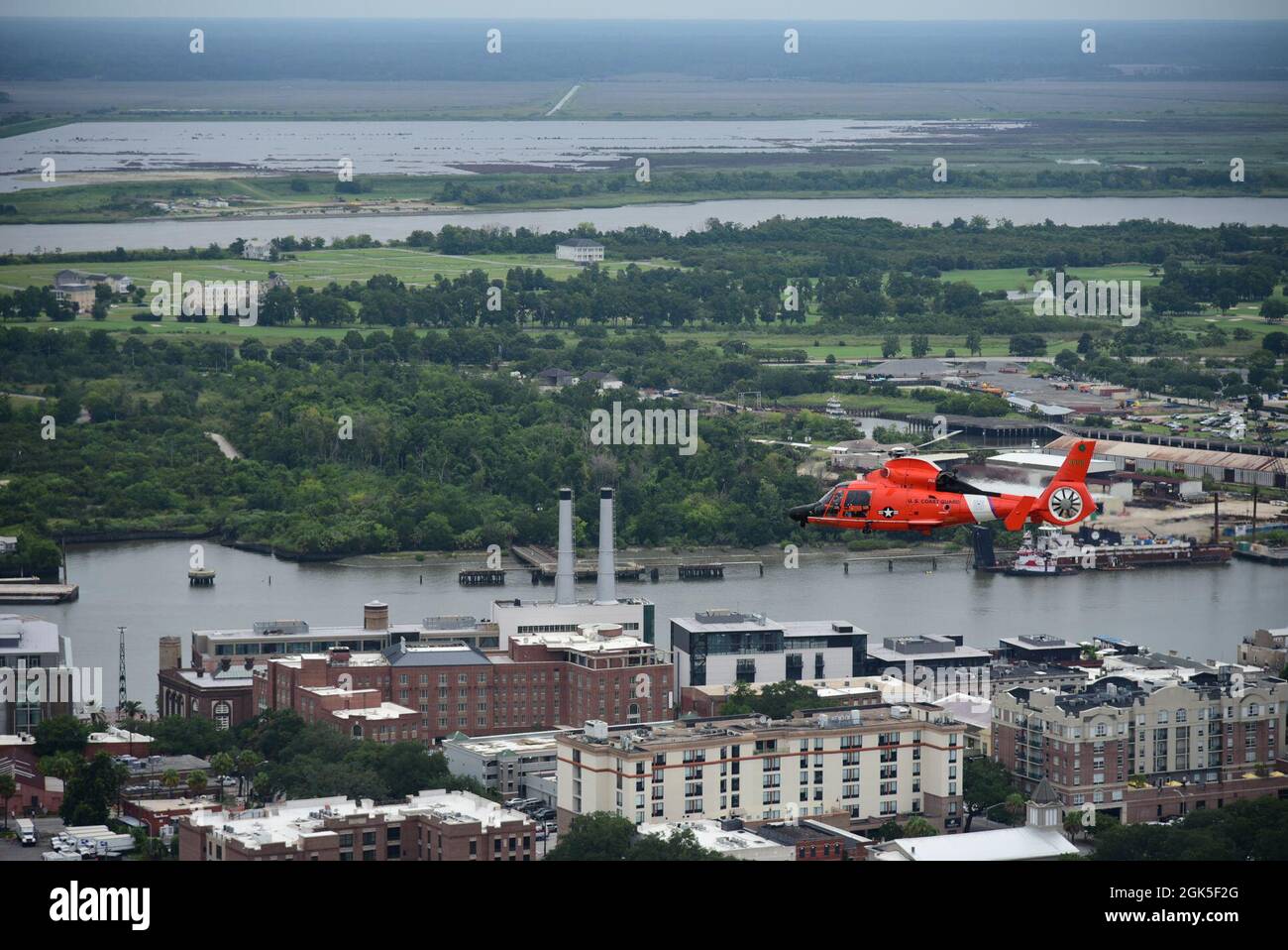 A U.S. Coast Guard MH-65D Dolphin helicopter crew from Air Station ...
