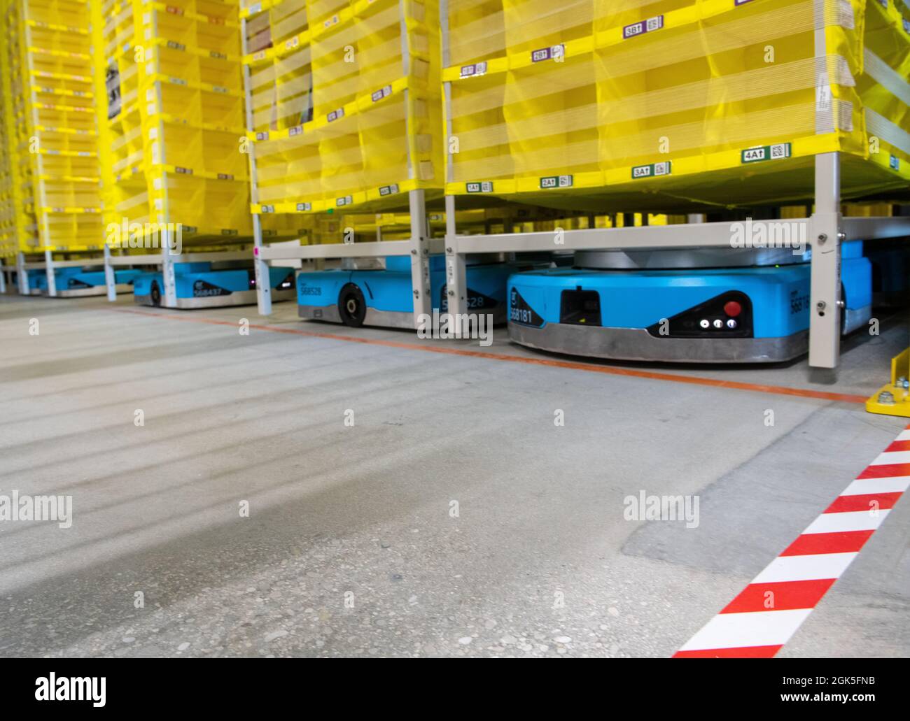 Graben, Germany. 13th Sep, 2021. Logistics robots move pallets through ...