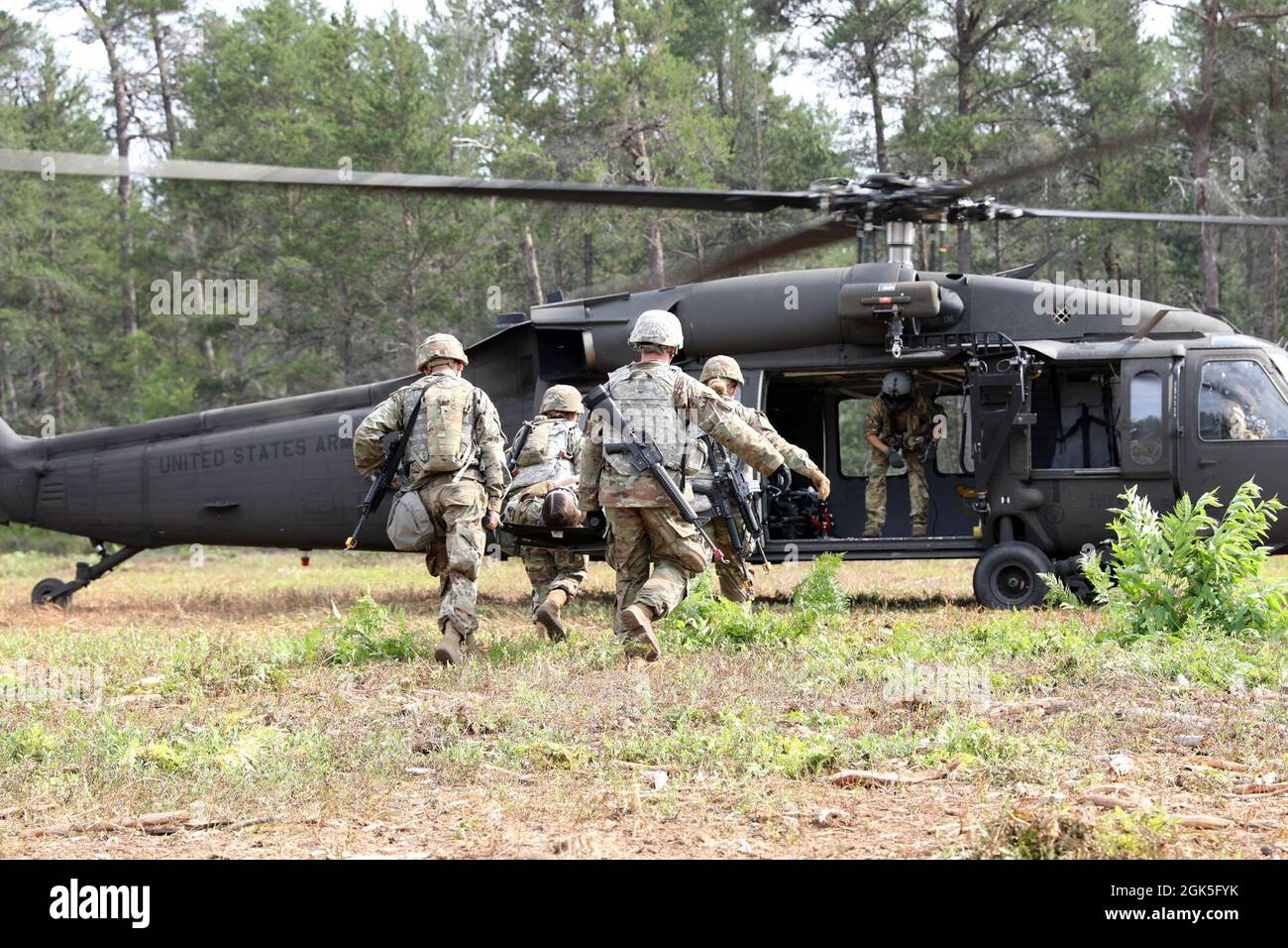 Soldiers assigned to Base Camp Hawkeye react to a mass casualty ...