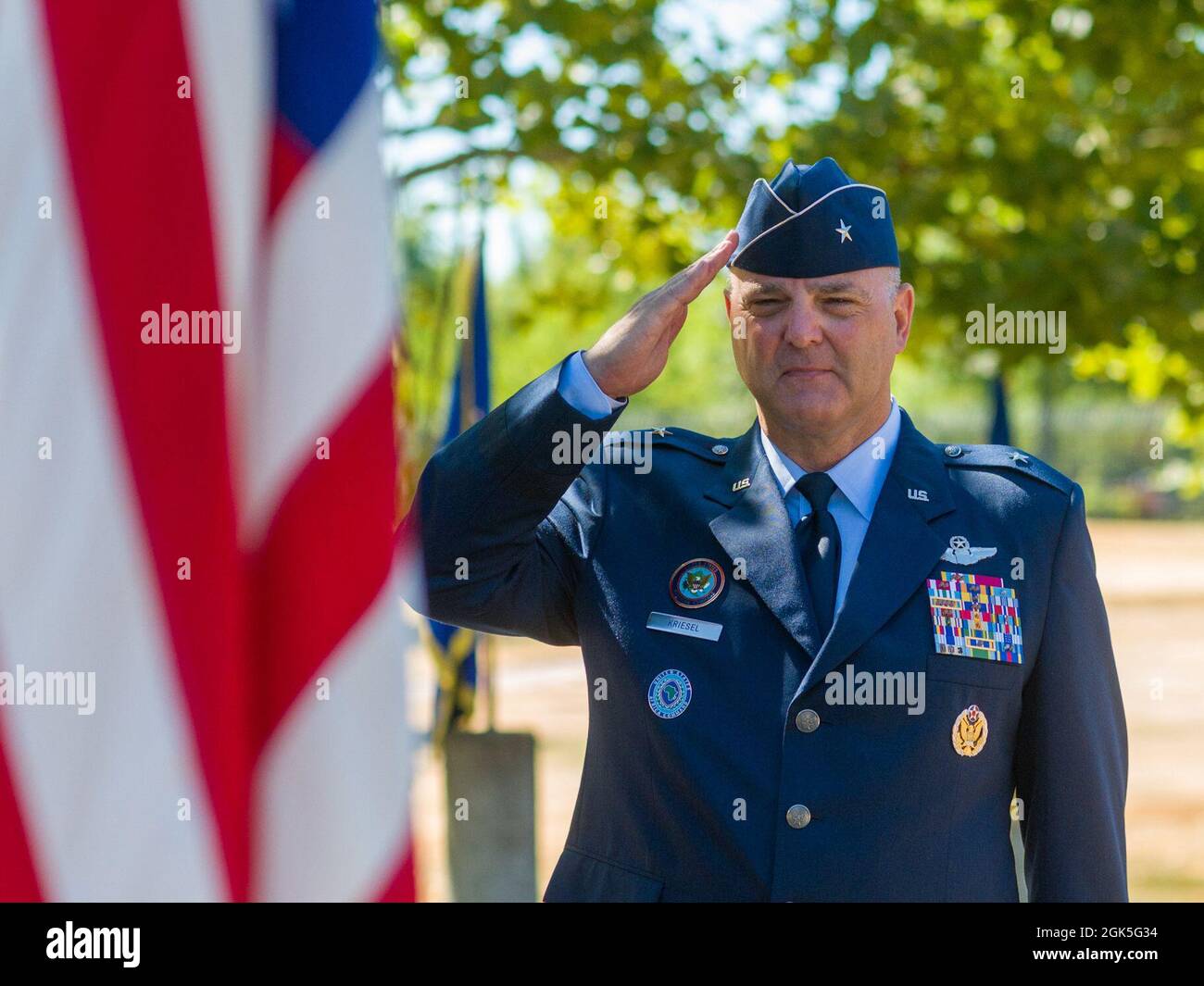 Oregon Air National Guard Brigadier General James R. Kriesel renders a ...