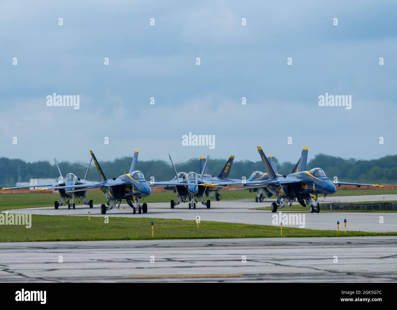 The U.S. Navy Blue Angels taxi back after an aerial performance at the ...