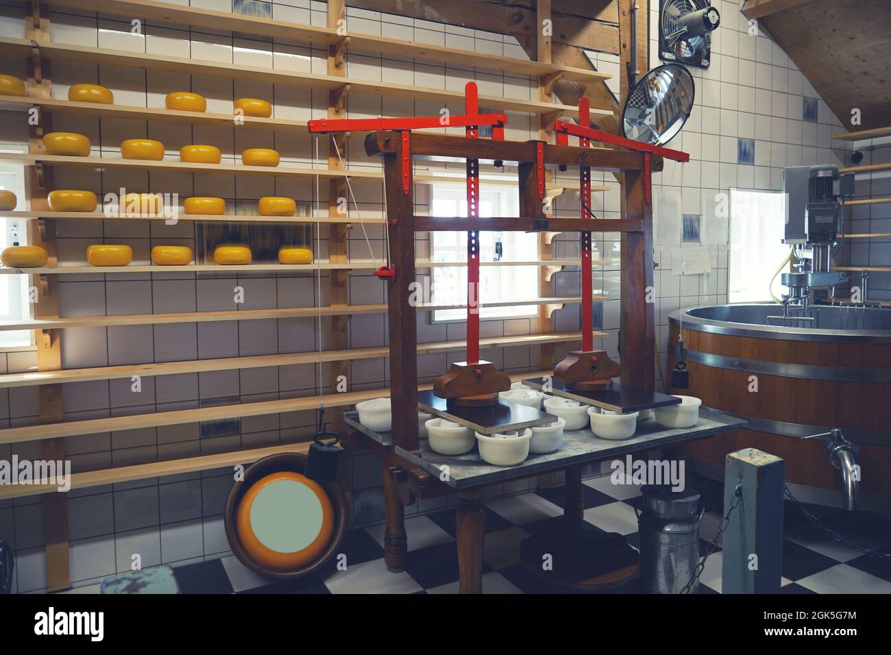 Interior view of cheese manufacturing shop Stock Photo - Alamy