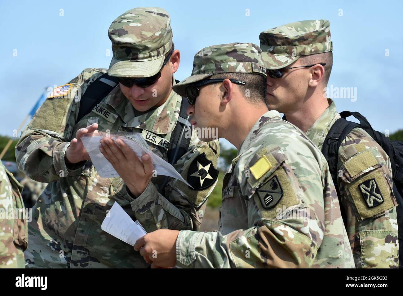 From left, Spcs. Bryan Roukie, Julian Taitague and Taylor Julian, all ...