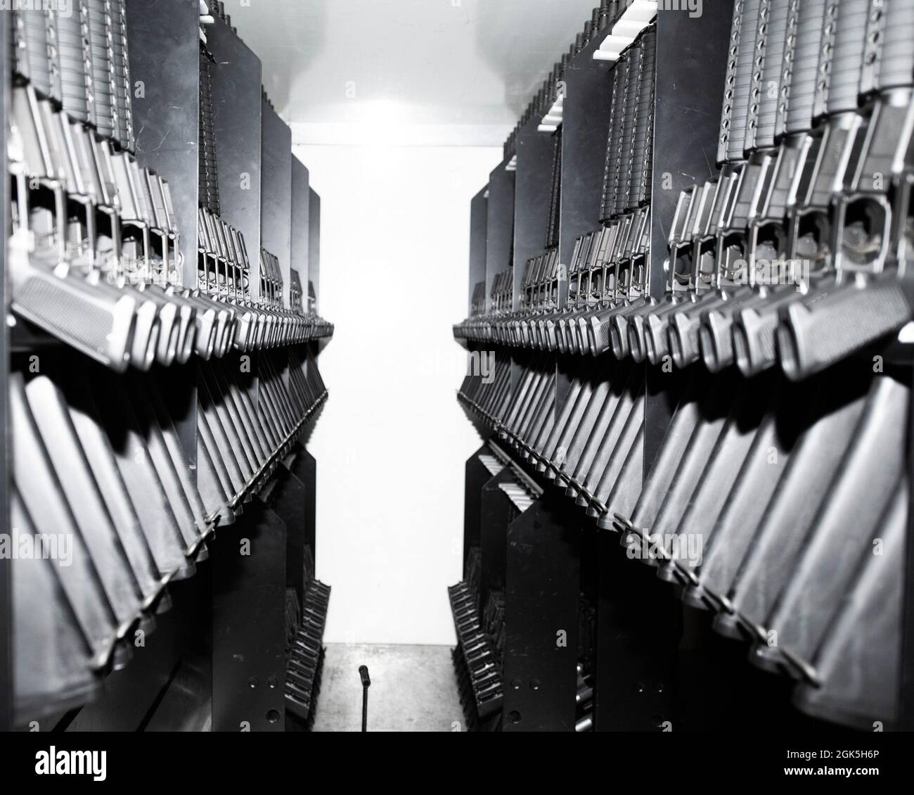 A compartment of weapons hang inside a storage unit Aug. 7, 2021, at ...