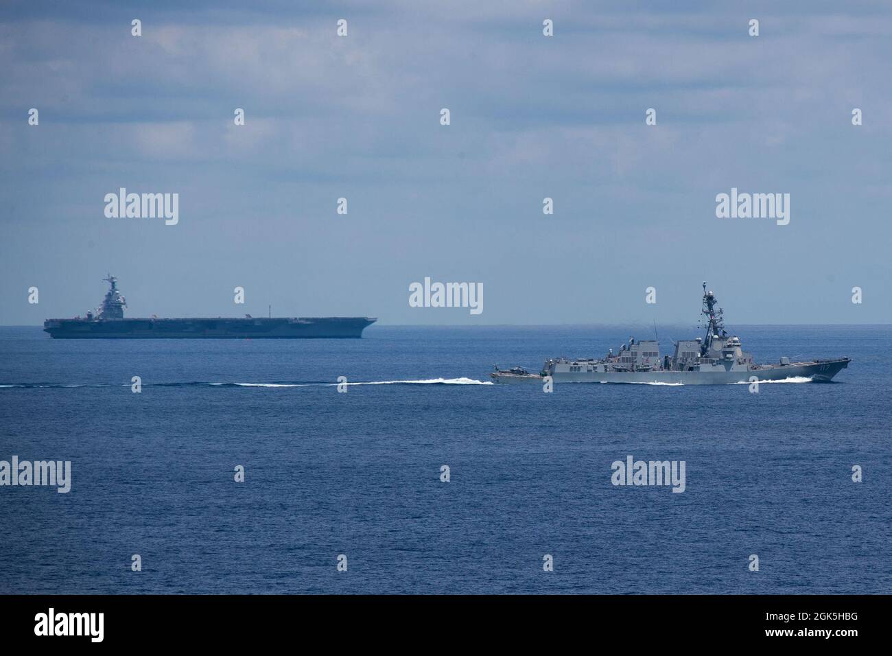 The Trials and Research Vessel NAWC 38 tows an explosive charge during ...