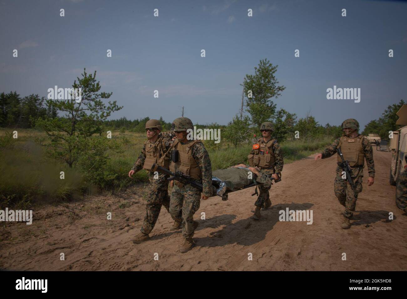 U.S. Marines and a U.S. Navy Corpsman with Combat Logistics Battalion ...