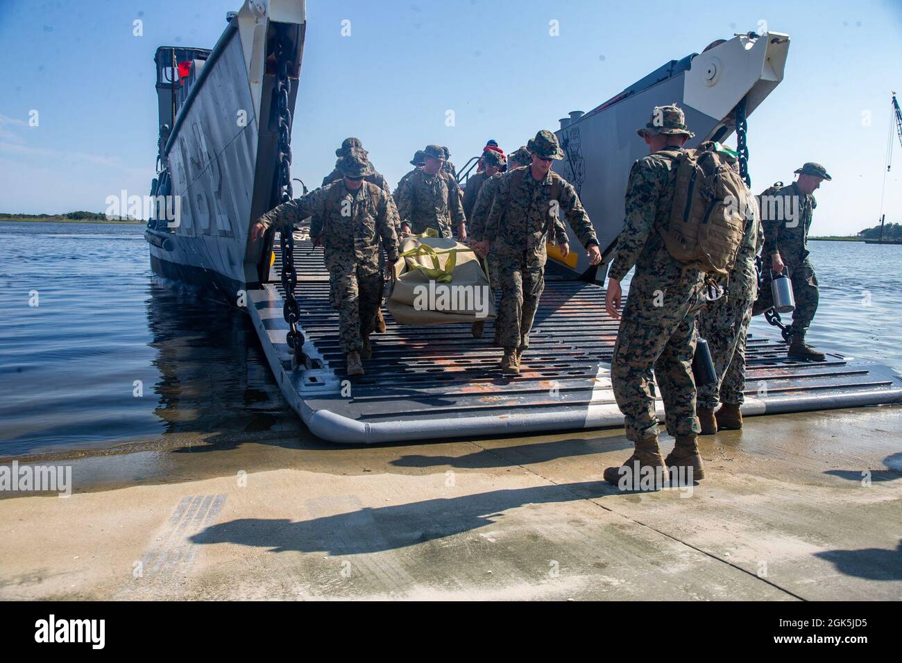 U.S. Marines and Sailors conduct a landing craft utility fuel transfer ...