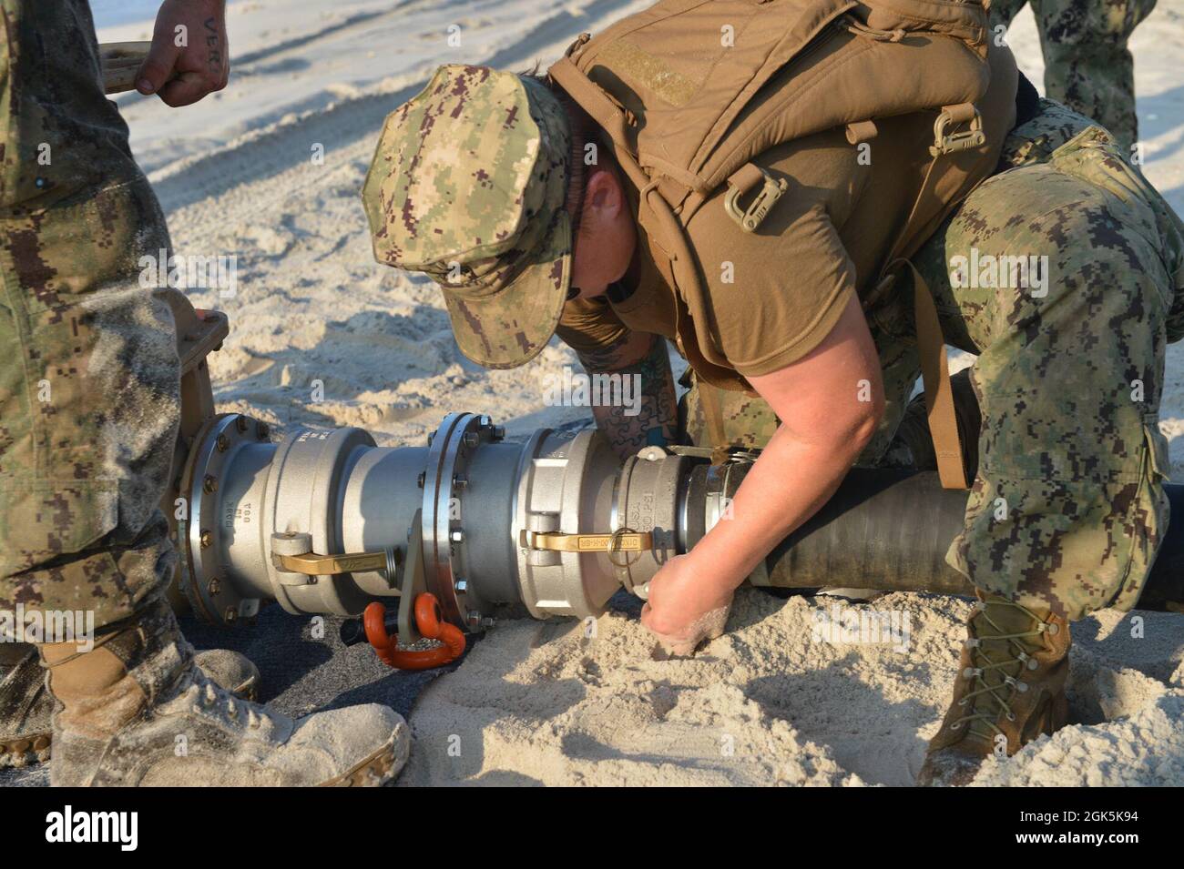 Sailors from Navy Cargo Handling Battalion ONE setup gear for the ...