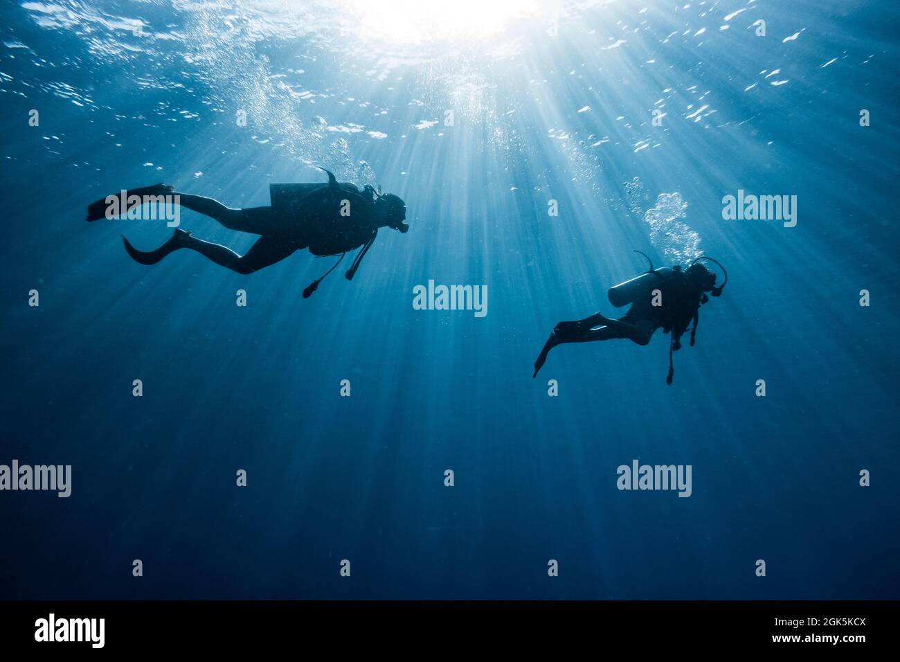 Scuba divers underwater sun rays hi-res stock photography and images ...