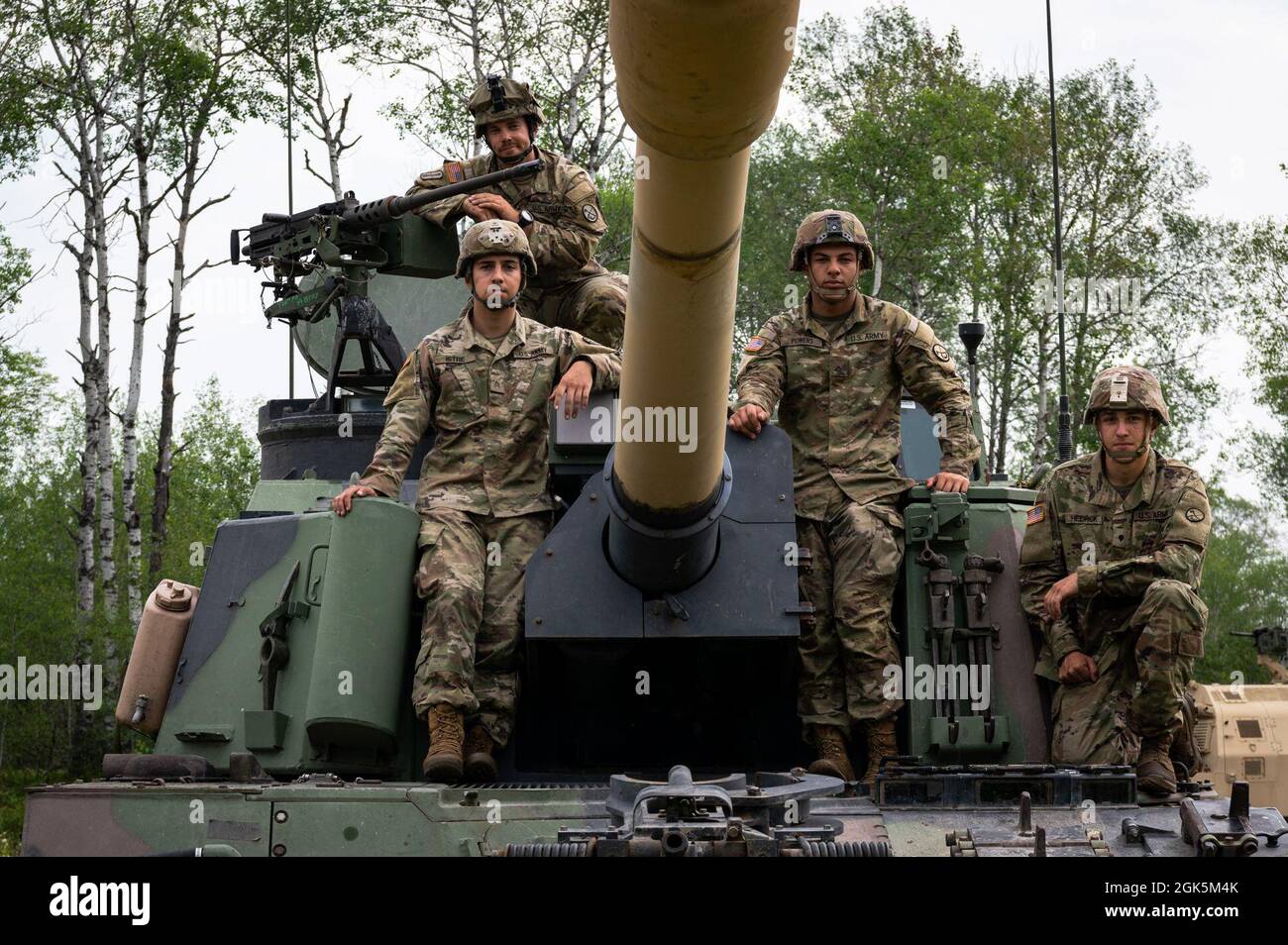U.S. Army cannon crew members Staff Sgt. Adam Brenner, a Howitzer ...