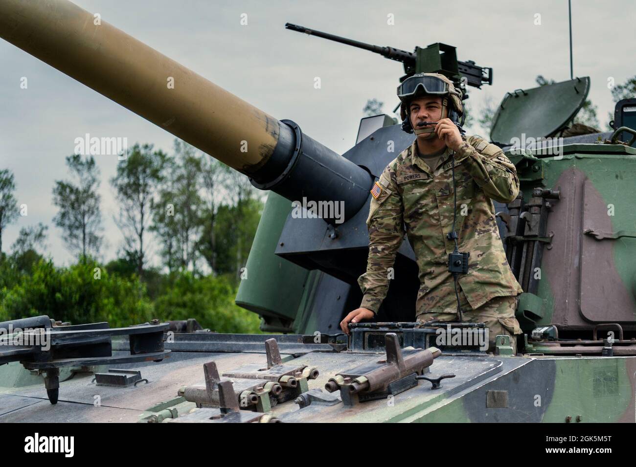 U.S. Army Private Isaiah Powers, a cannon crew cannoneer, from the 1st ...