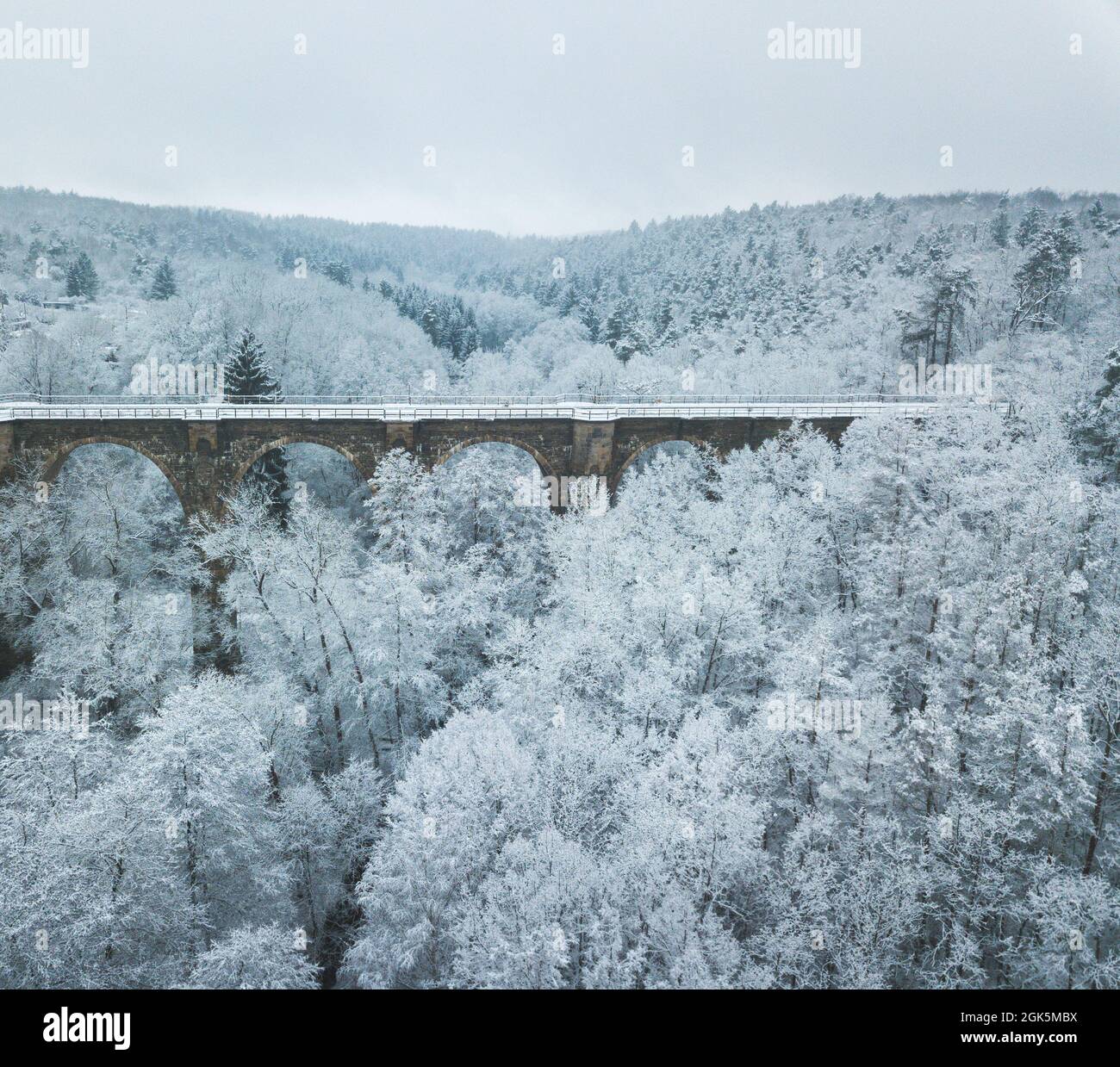 Scenic railroad bridge in winter Stock Photo - Alamy