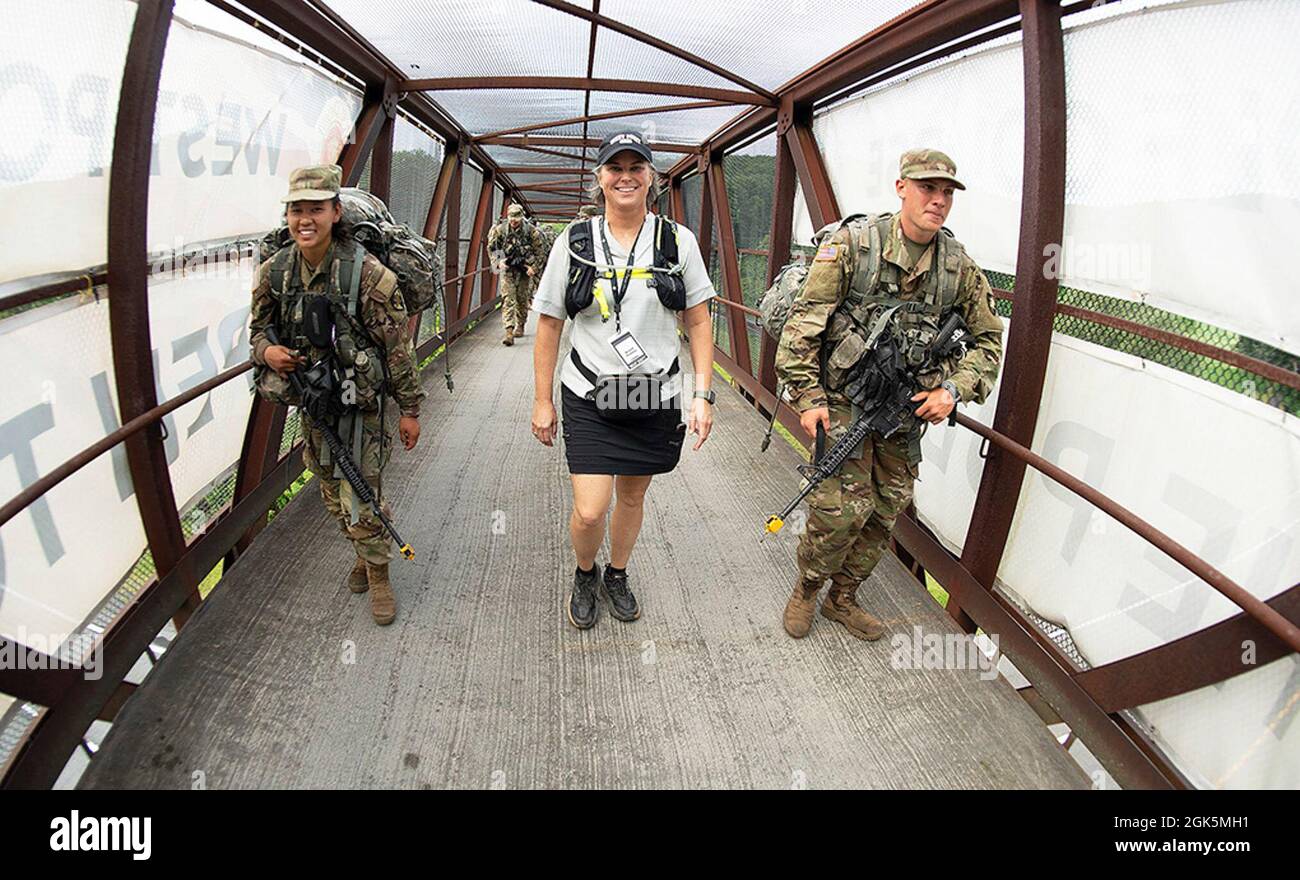 U.S. Military Academy Class of 1994 graduate Brandi Peasley walks with ...