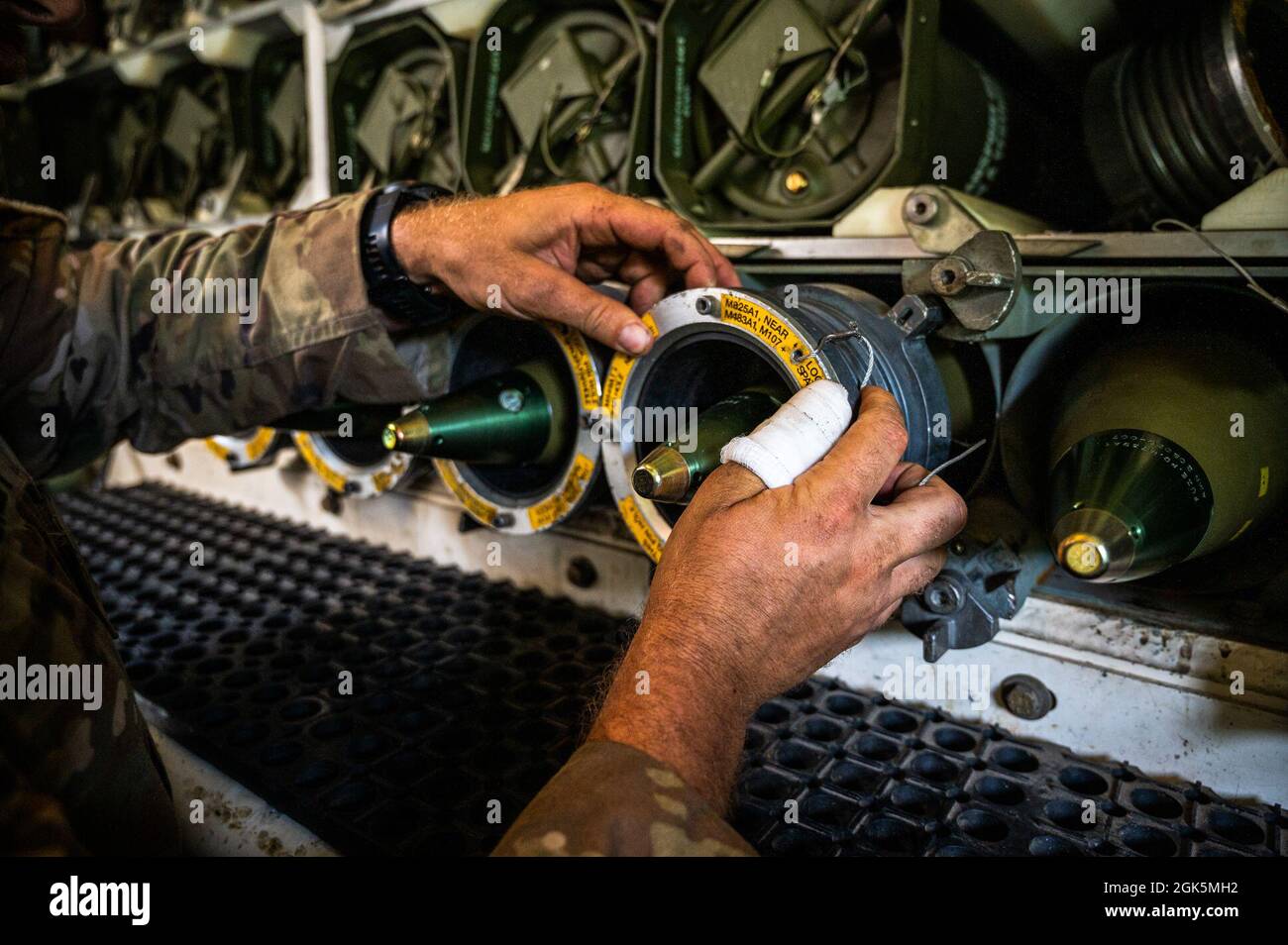 U.S. Army Staff Sgt. Adam Brenner, a cannon crew Howitzer section chief ...