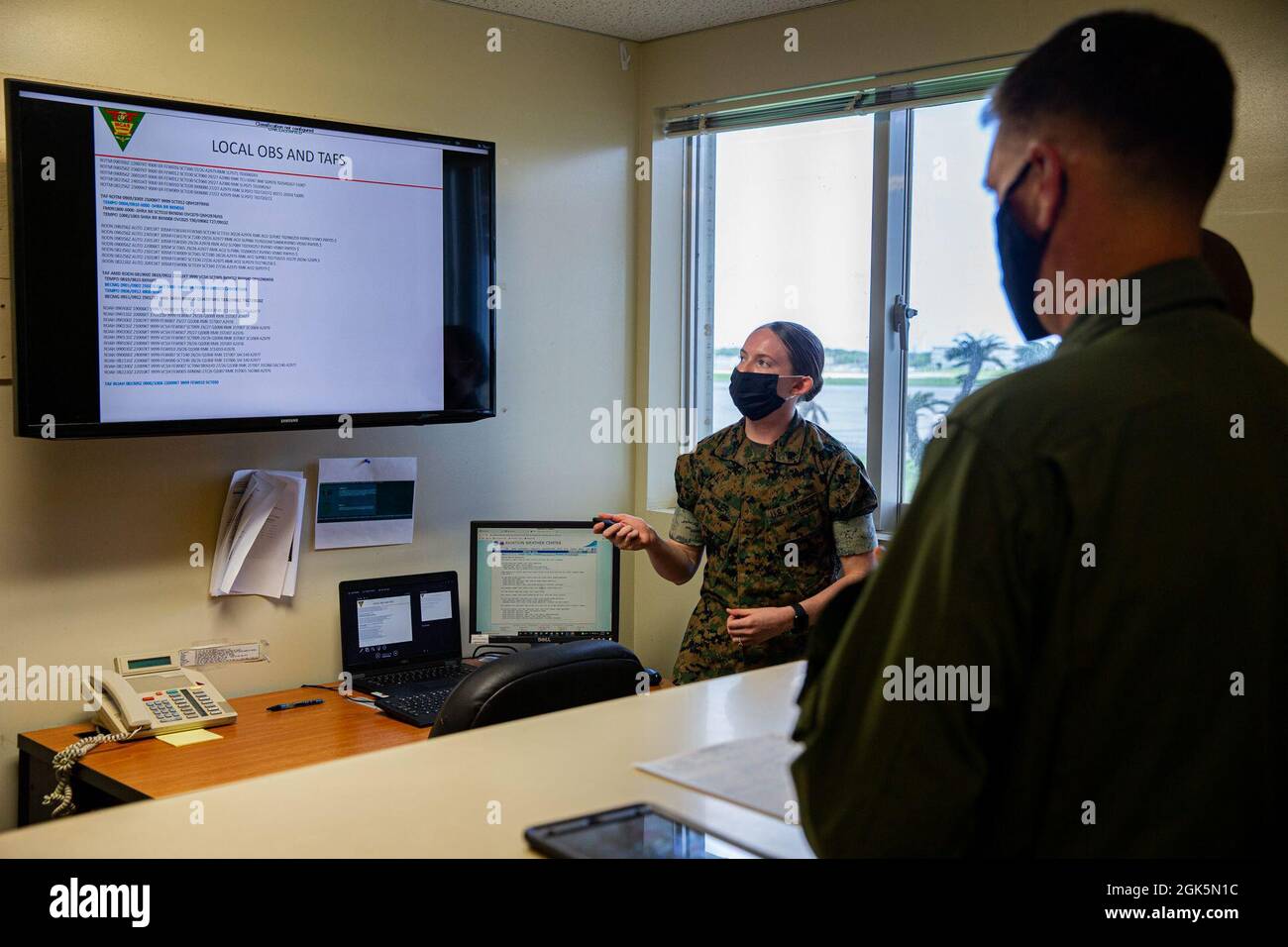 U.S. Marine Corps Cpl. Julia Hubler, a meteorological and oceanography ...