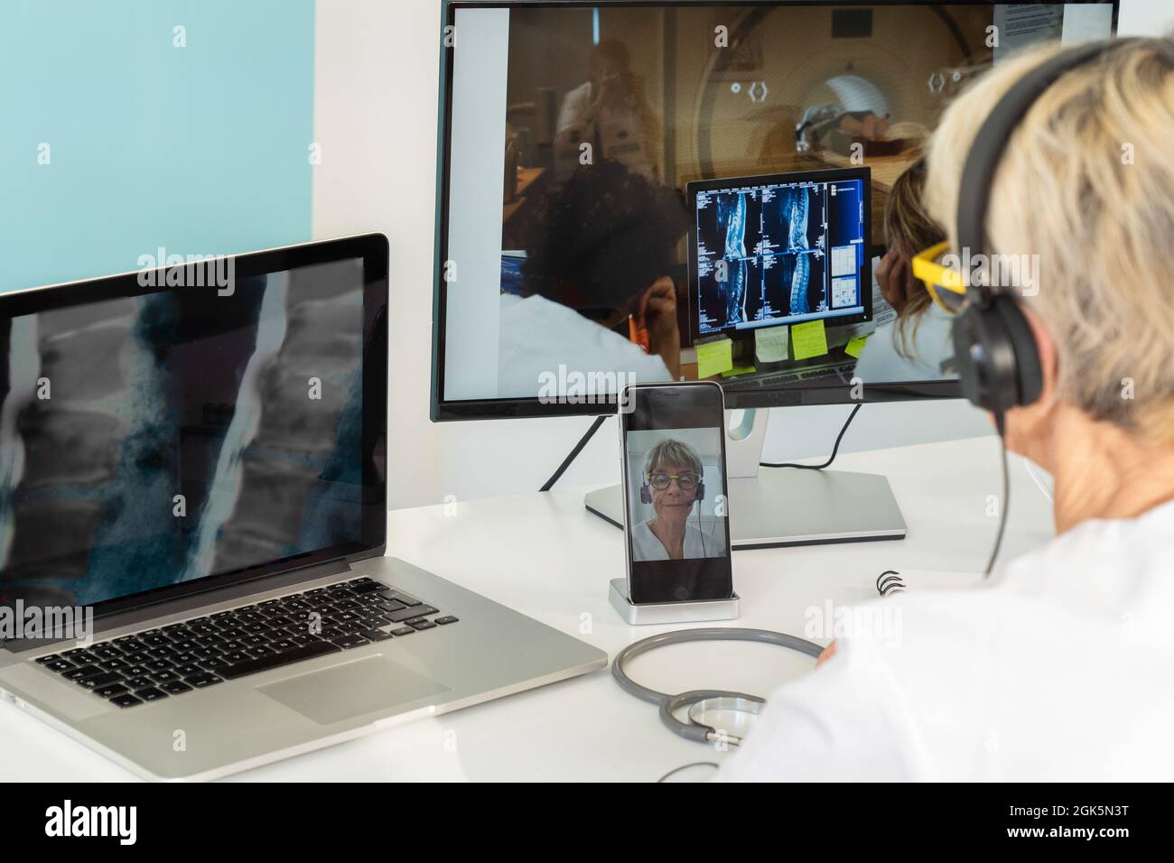 Teleconsultation between two doctors with medical images of the spine ...