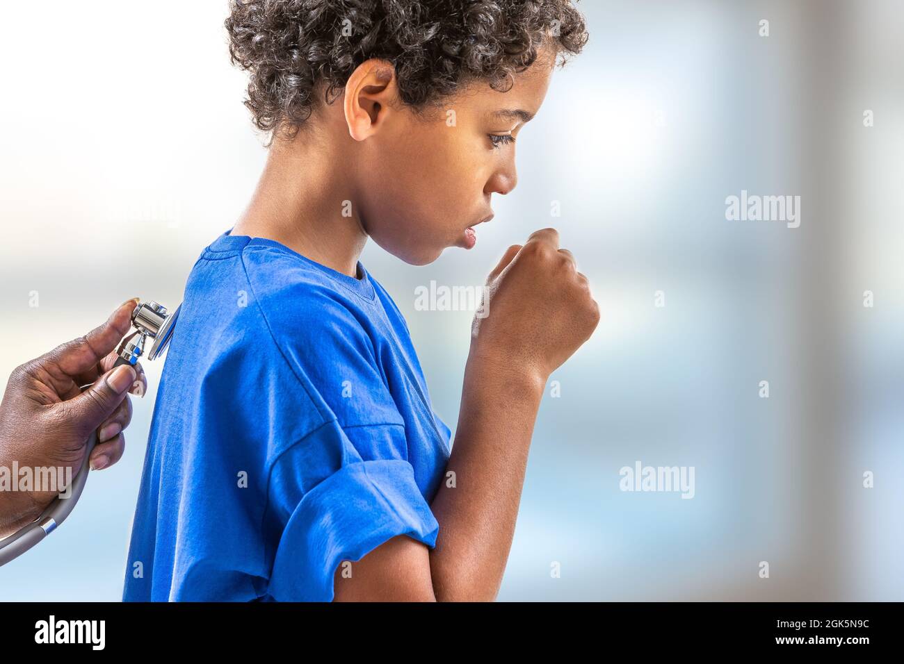 Little boy coughing on white background Stock Photo - Alamy