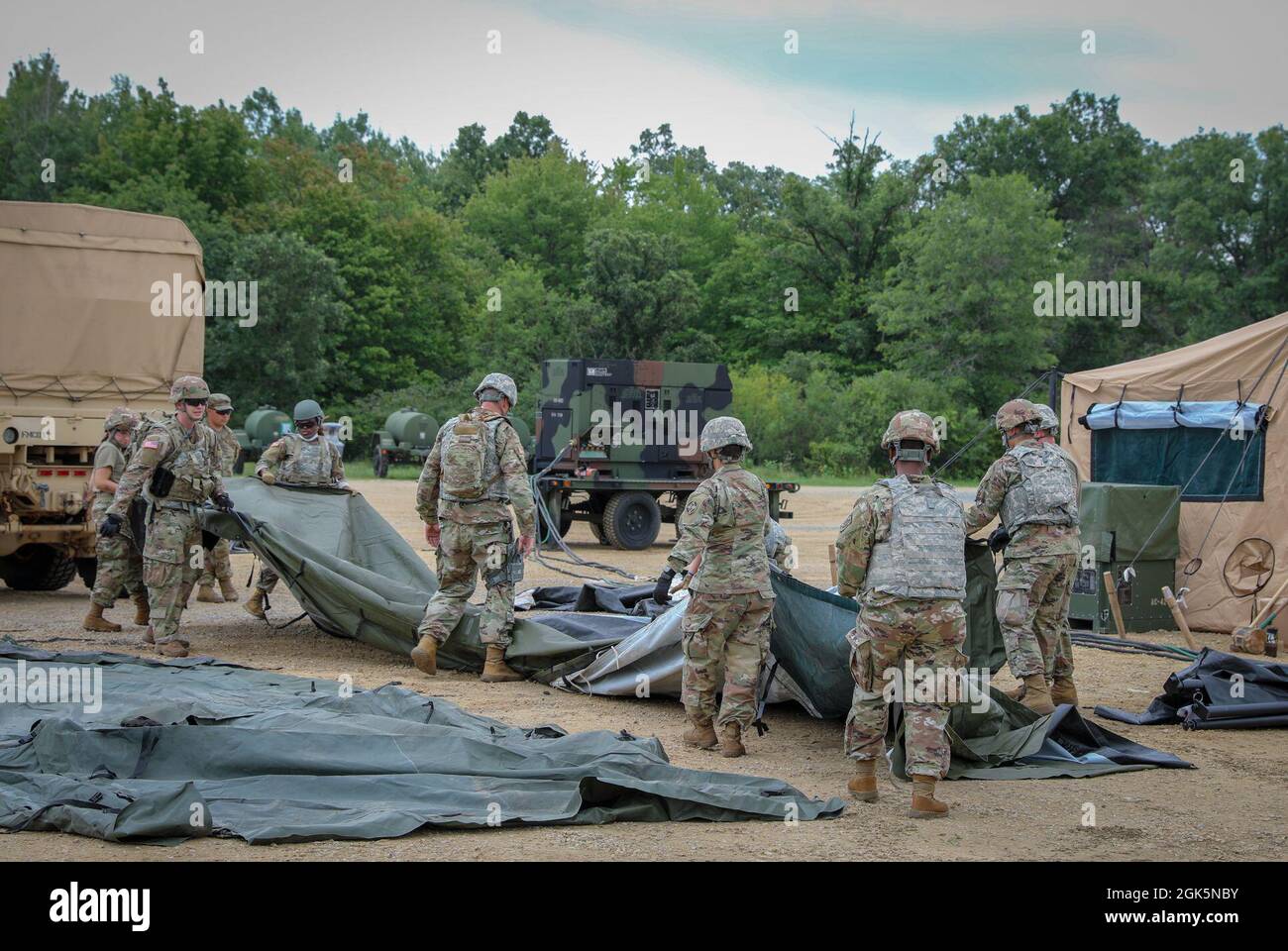 U.S. Army Reserve Soldiers from the 348th Field Hospital set up a tent ...