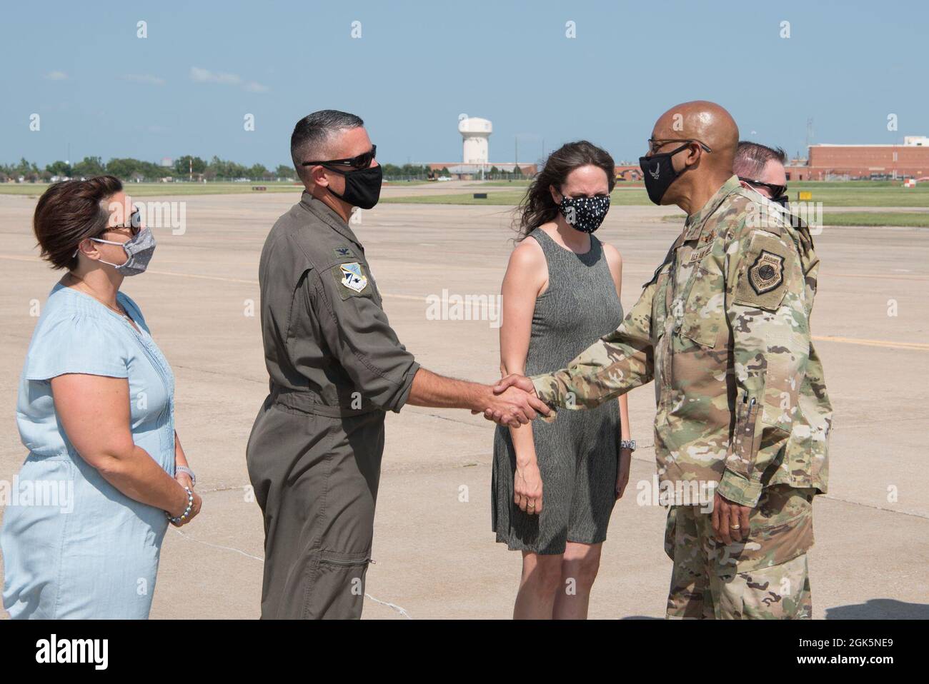 Col. Keven Coyle, 552nd Air Control Wing commander, middle left, and ...