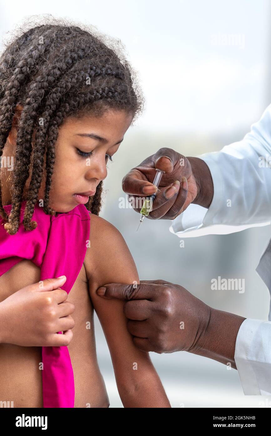 Child arm receiving an injection hi-res stock photography and images ...