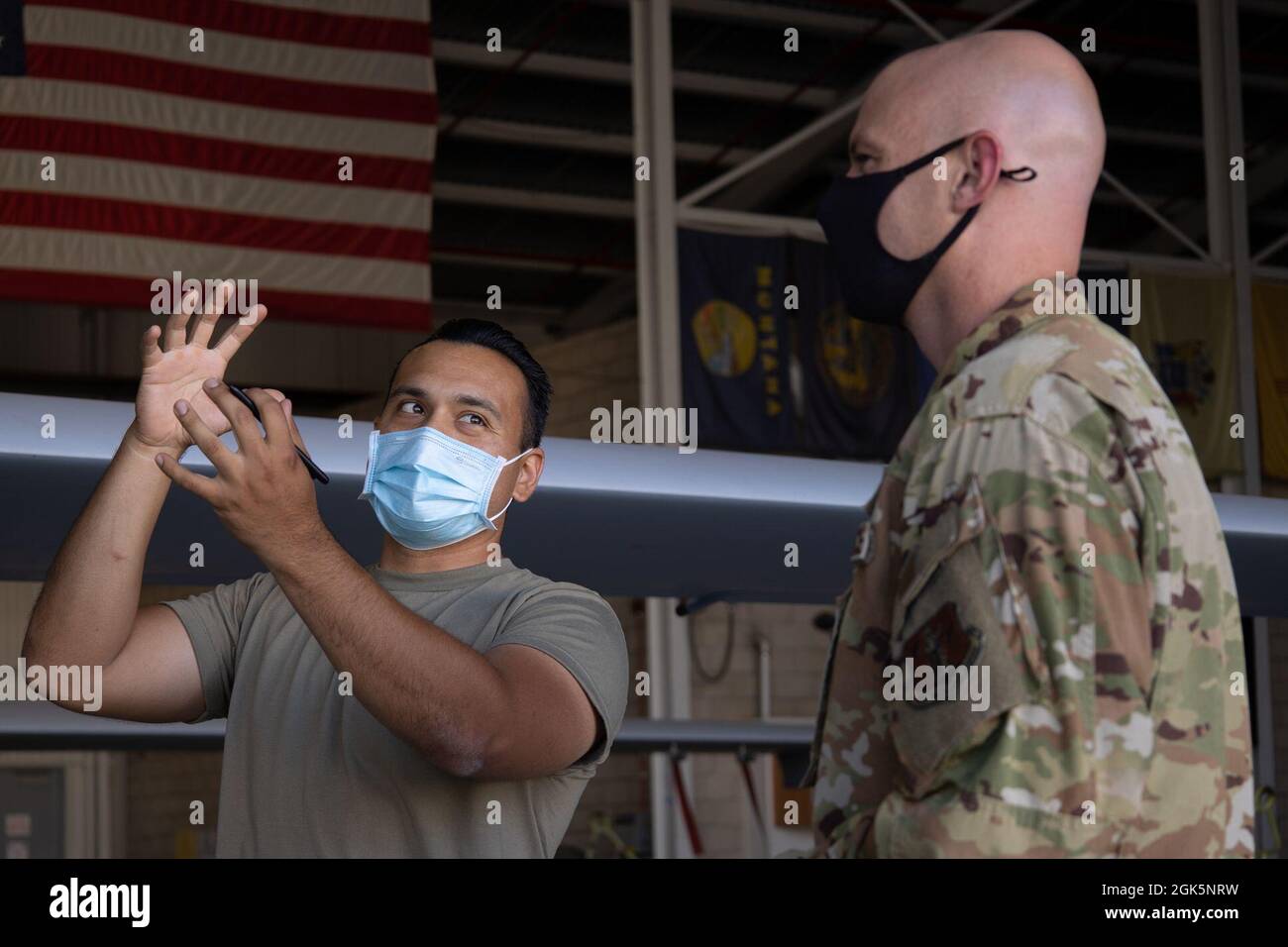 U.S. Air Force Tech. Sgt. Daniel, left, a tactical aircraft mechanic ...