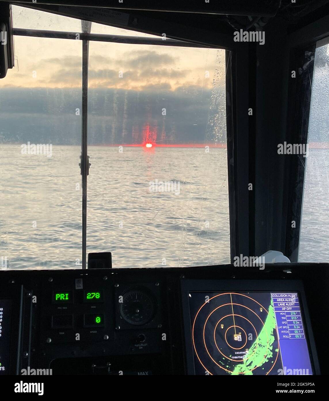 Sunset is observed by a landing craft, air cushioned (LCAC) craftmaster ...