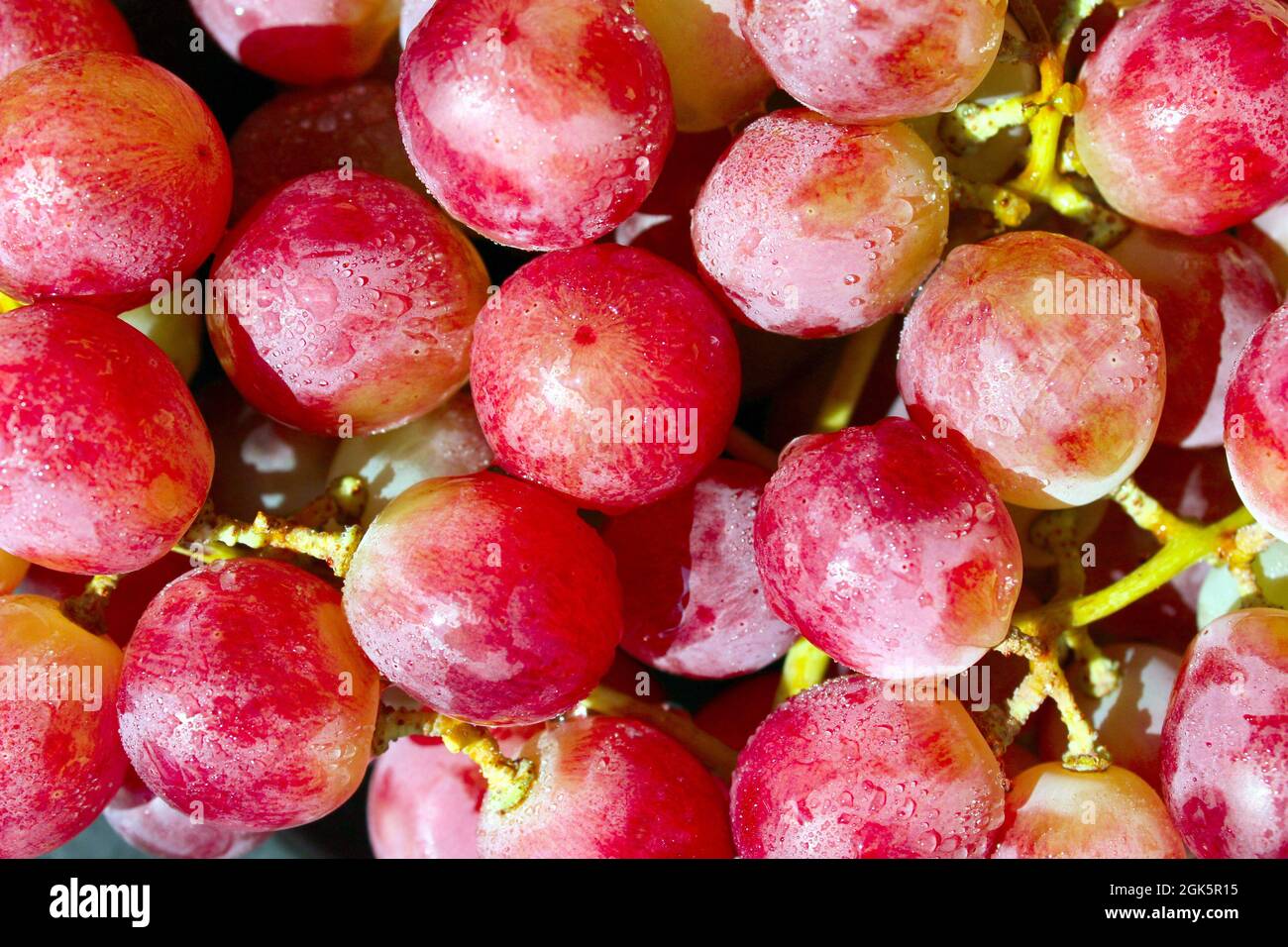 Red grape on table. Top view with copy space Stock Photo - Alamy