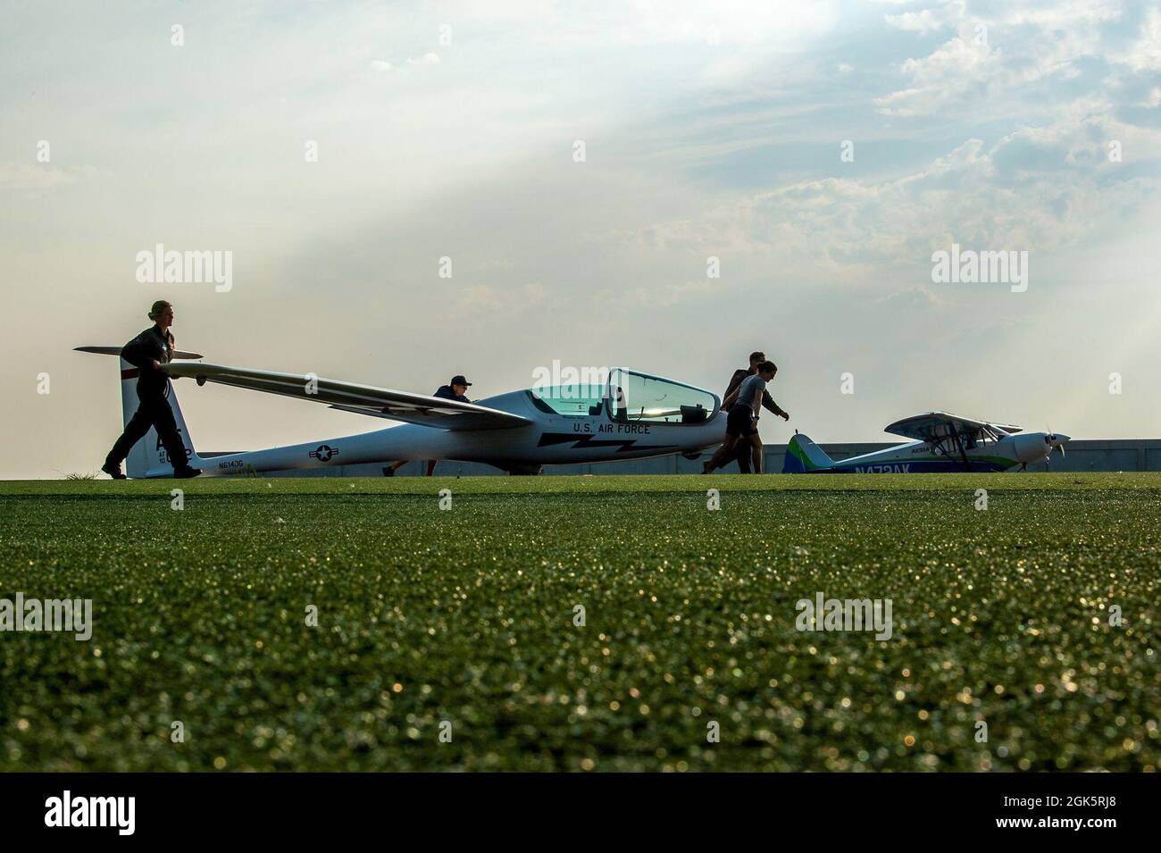 U.S. AIR FORCE ACADEMY, Colo. – U.S. Air Force Academy cadets push a ...