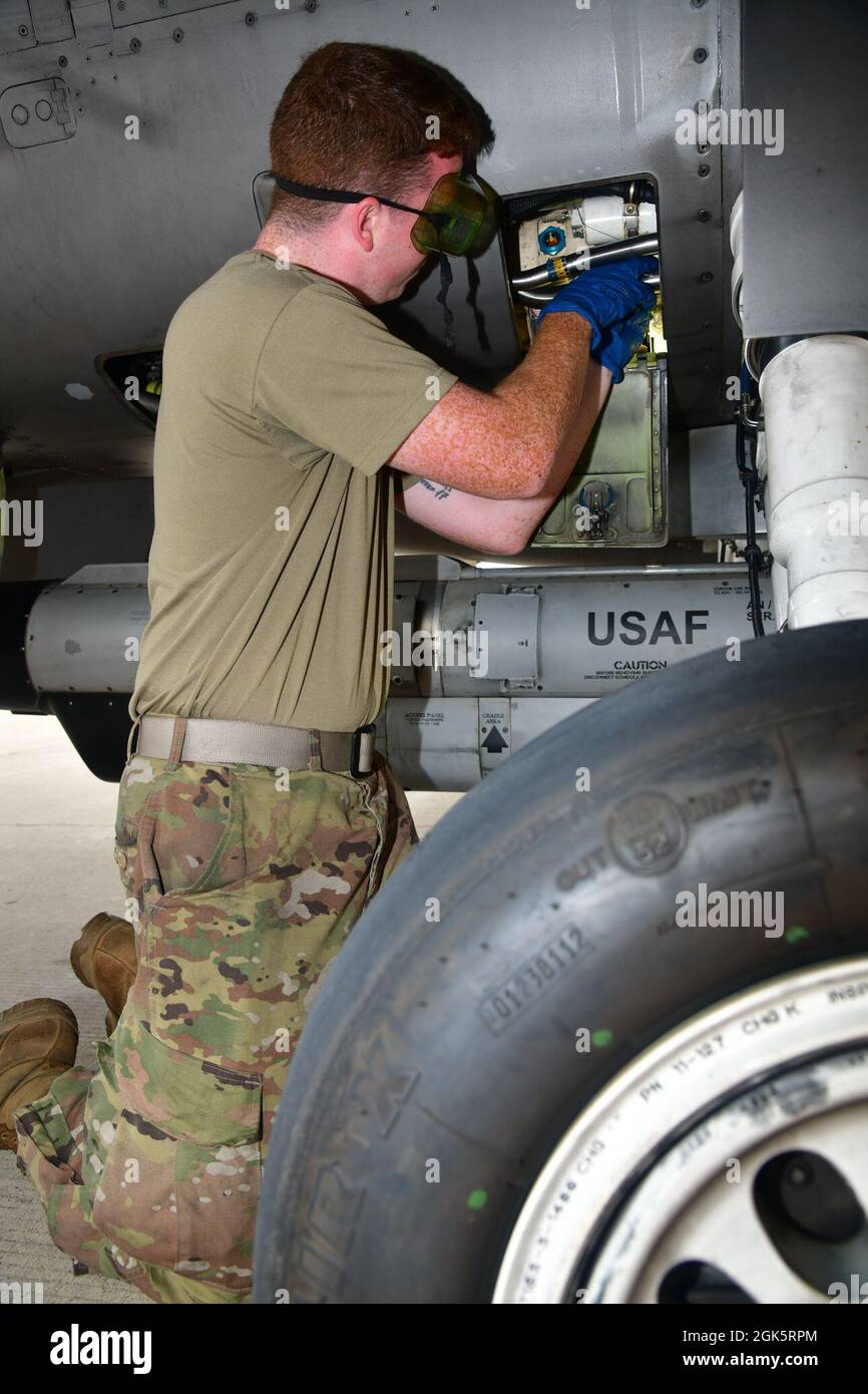 A Tactical Aircraft Maintenance specialist, or crew chief, assigned to ...